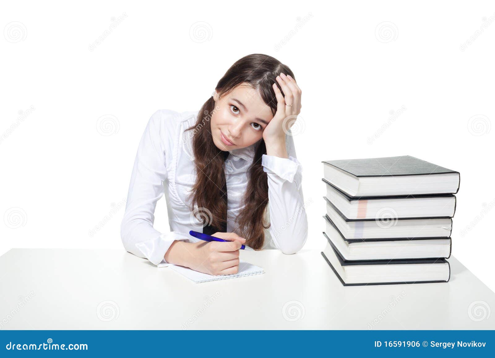 Sad girl with books stock photo. Image of pile, knowledge - 16591906