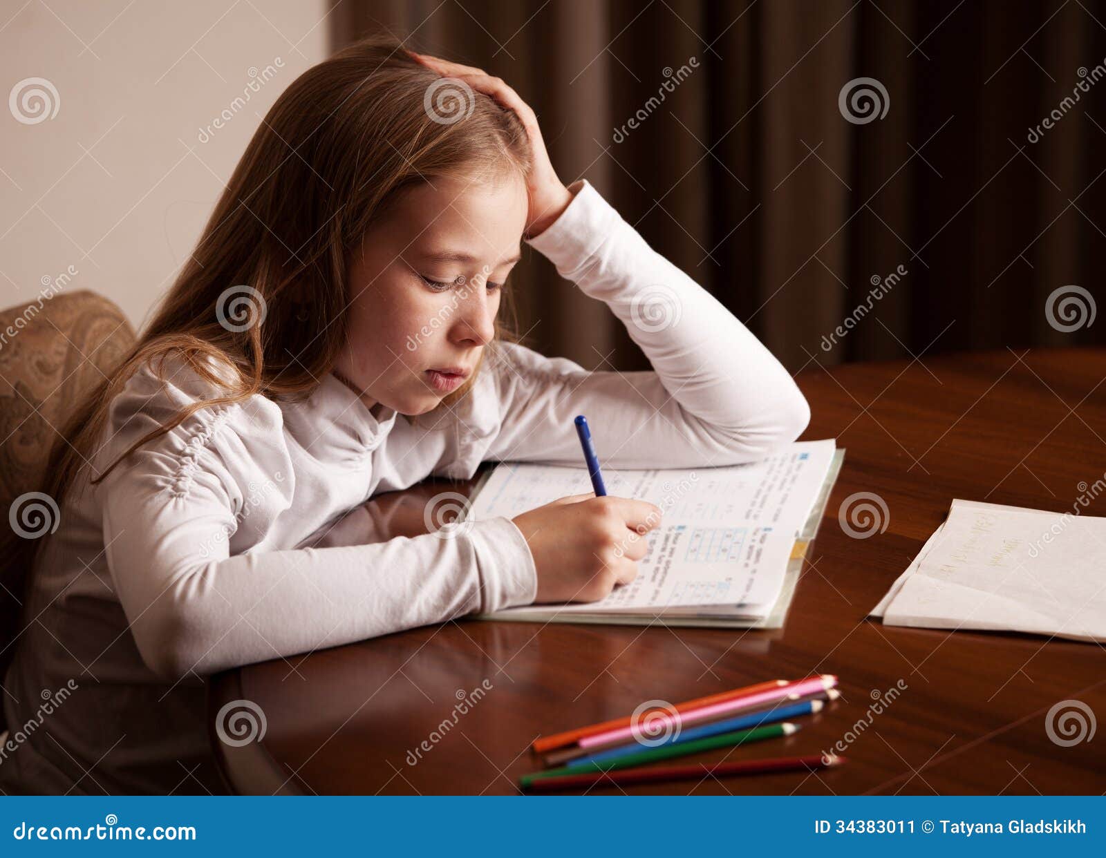 Sad Girl Doing Homework Stock Image - Image: 34383011