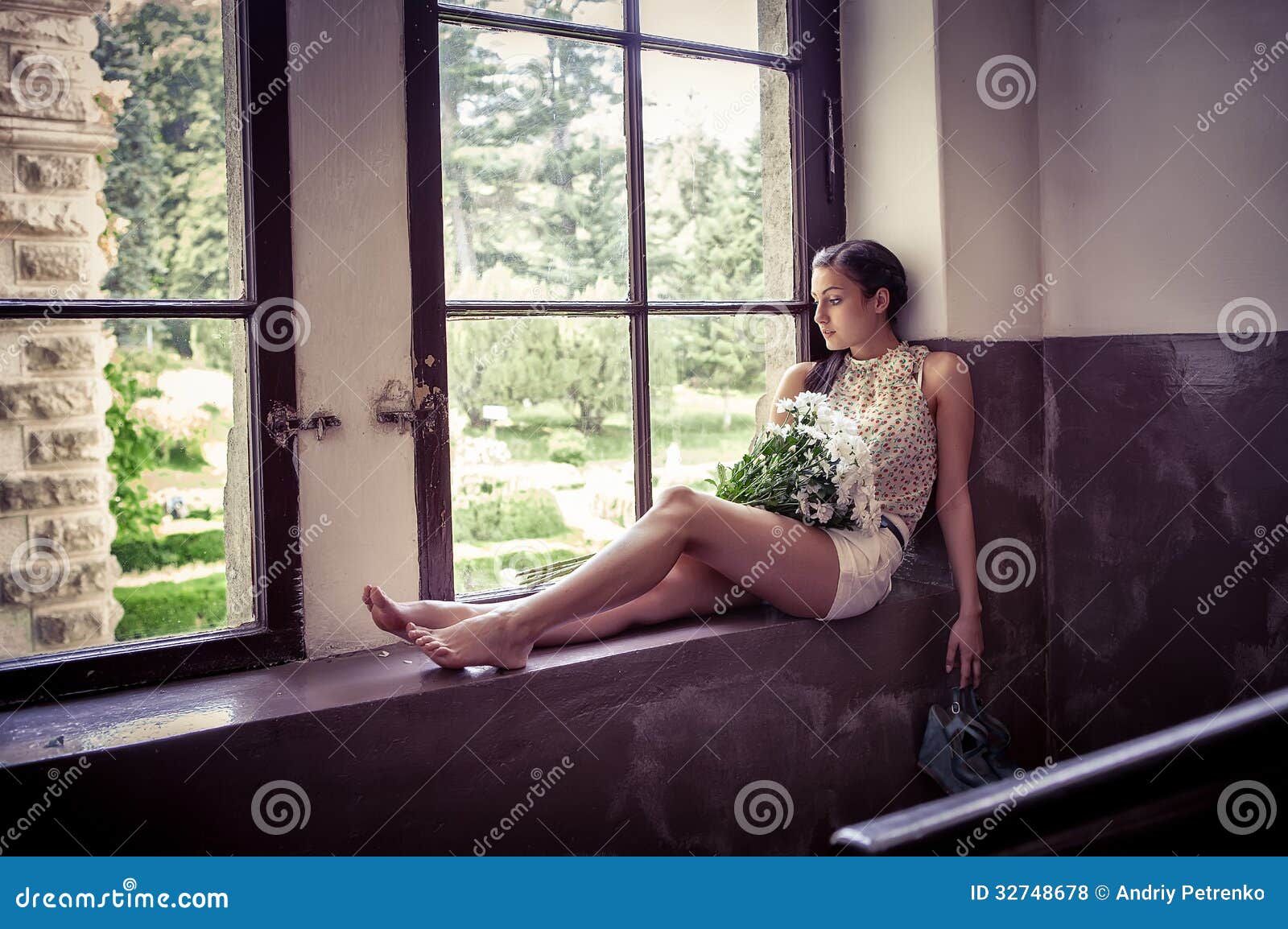 Sad girl near a window stock photo. Image of melancholy - 32748678