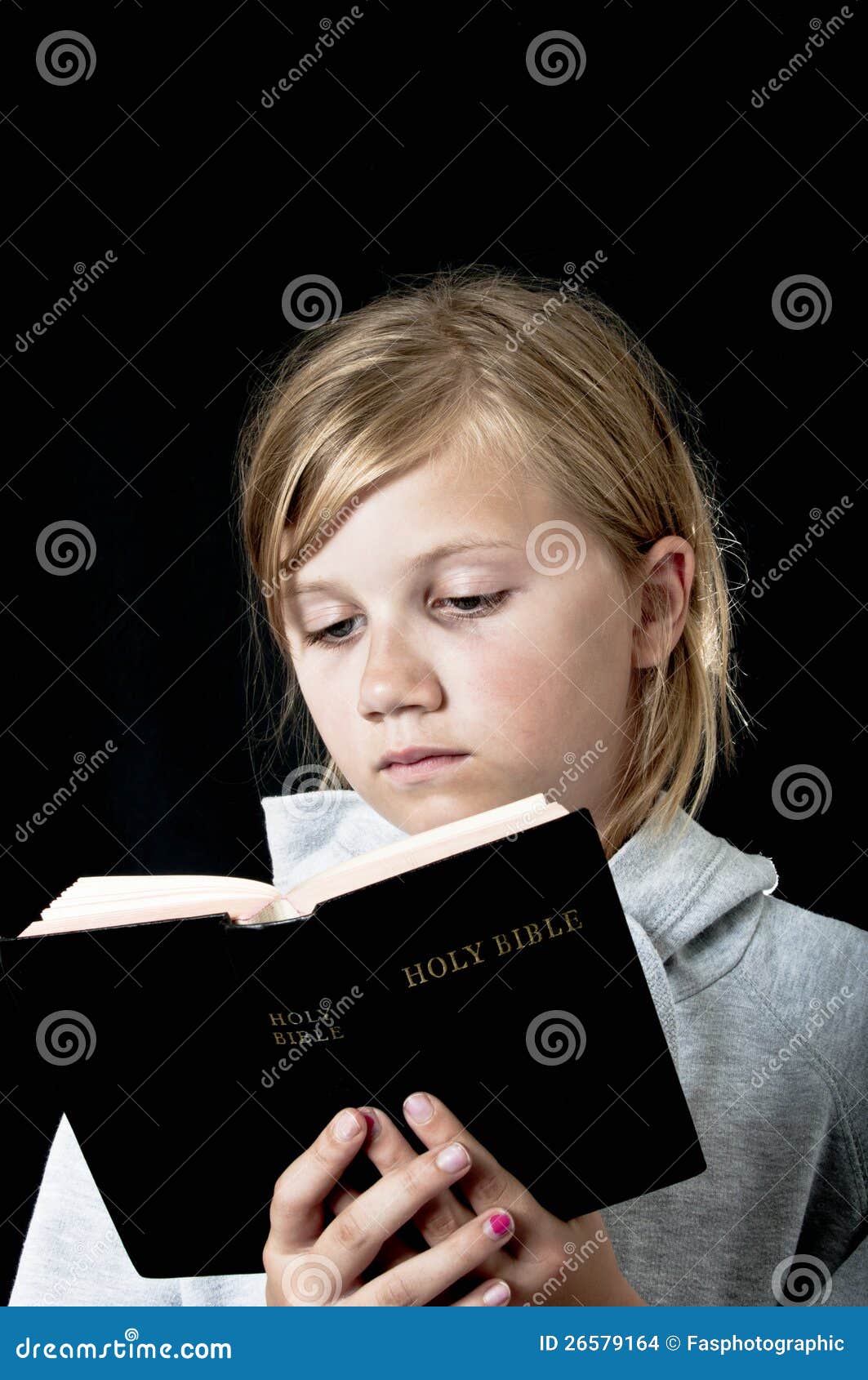 Sad girl reading the bible stock photo. Image of girl - 26579164