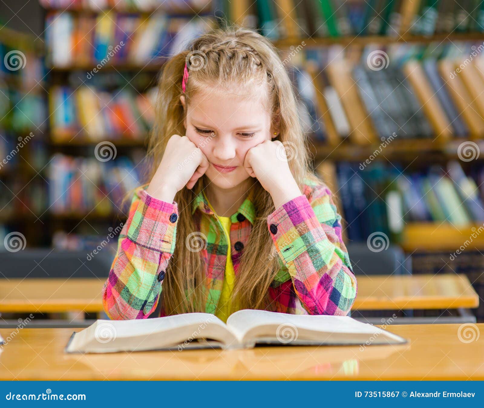 Sad Girl Reading a Book in the Library Stock Image - Image of little ...