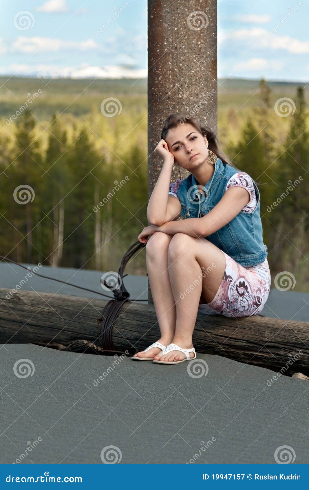 Sad girl sitting on a log stock image. Image of female - 19947157