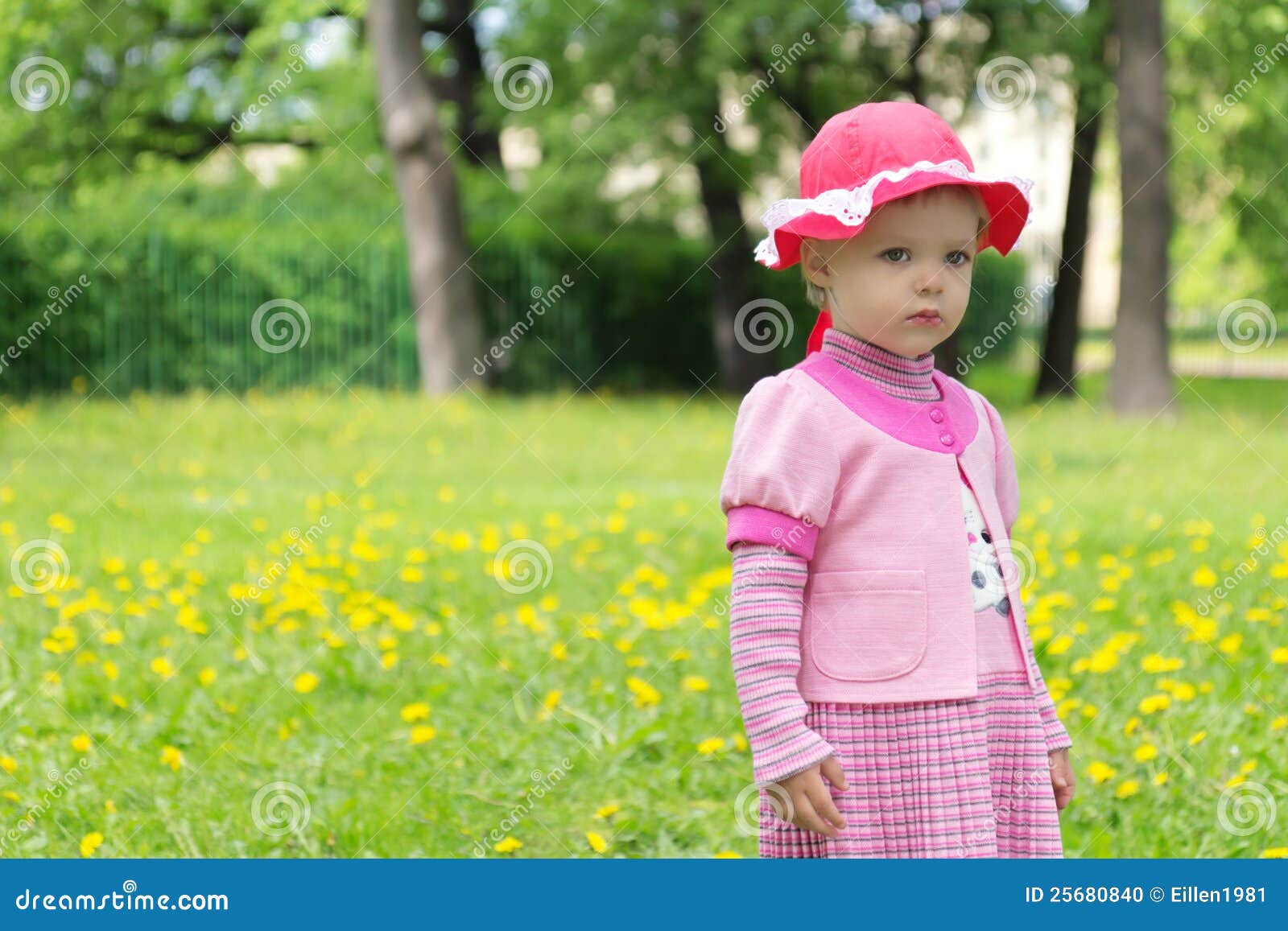 Sad girl in spring park stock photo. Image of little - 25680840
