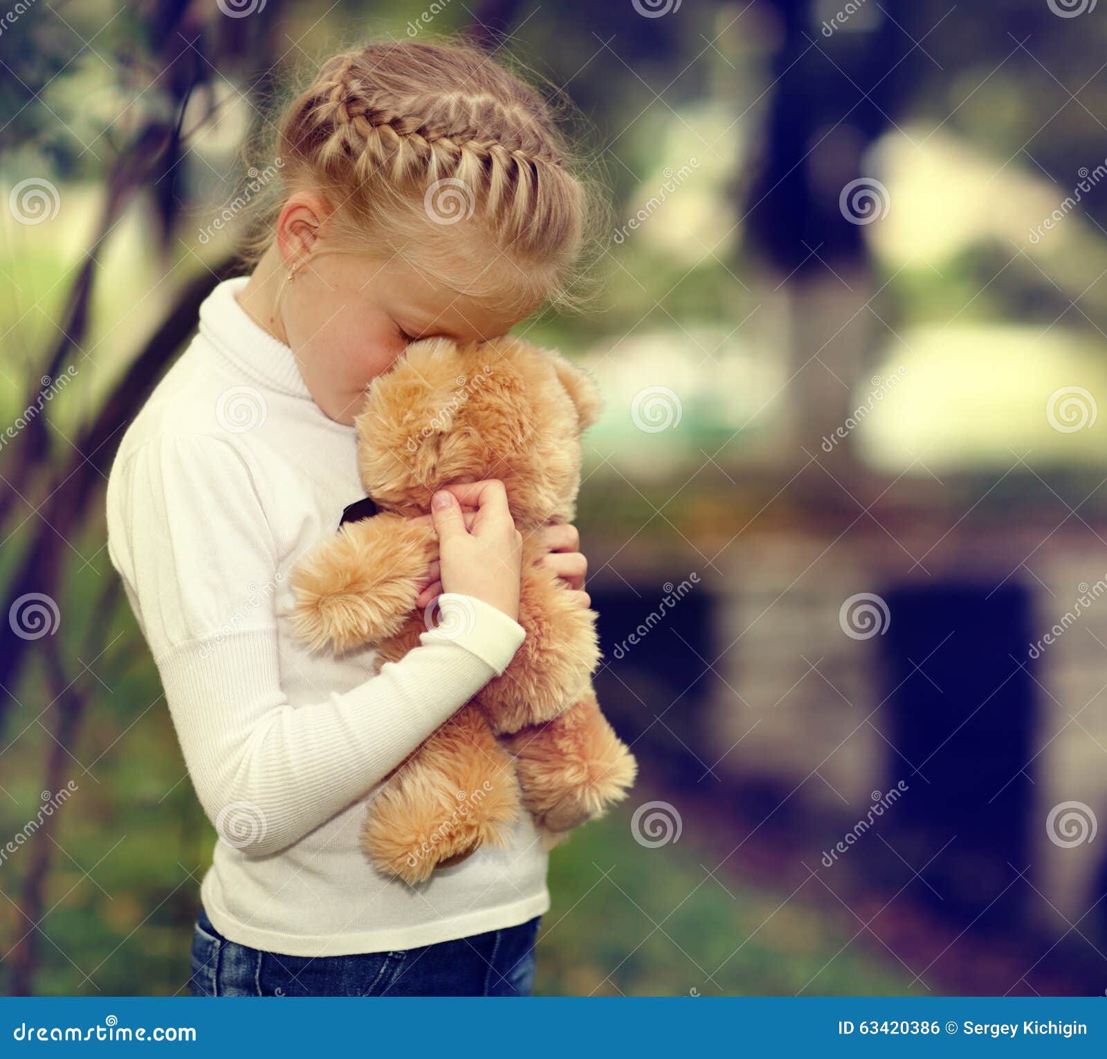 Sad girl with toy stock photo. Image of missing, cute - 63420386