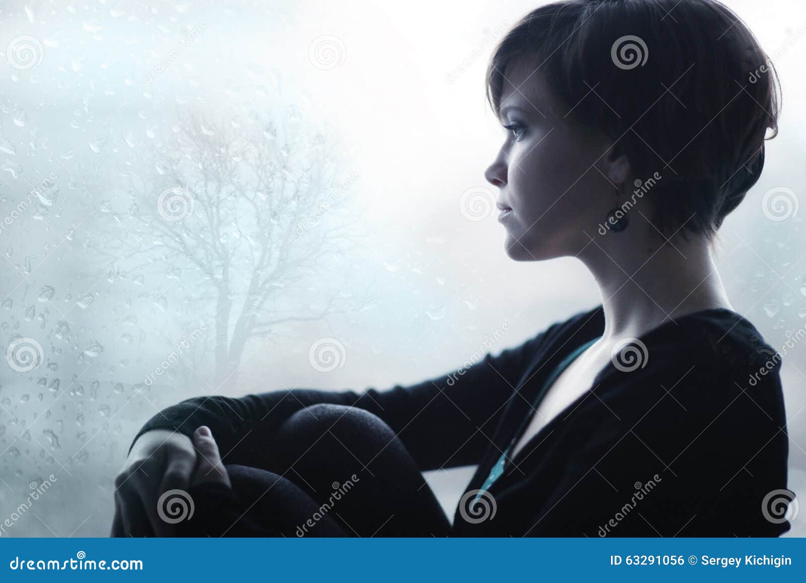 Sad Girl on the Windowsill Looking Out Window Stock Photo - Image of ...