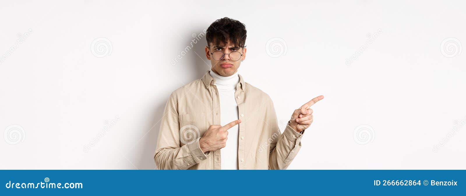 Sad and Grumpy Boy Pointing Fingers Left, Sulking with Childish ...