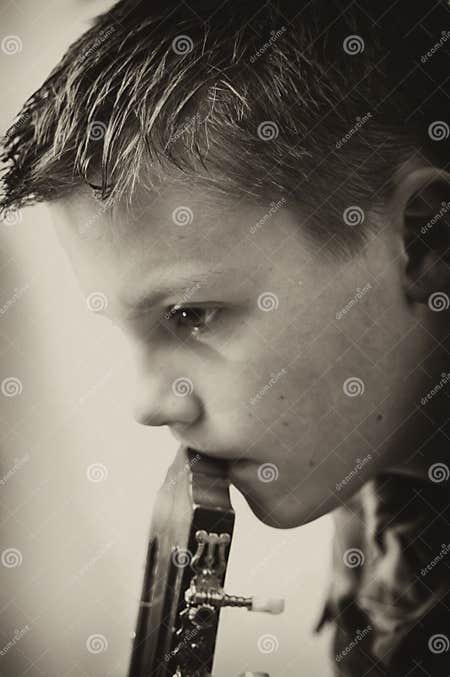 Sad guitar player boy stock photo. Image of melancholy - 12306048