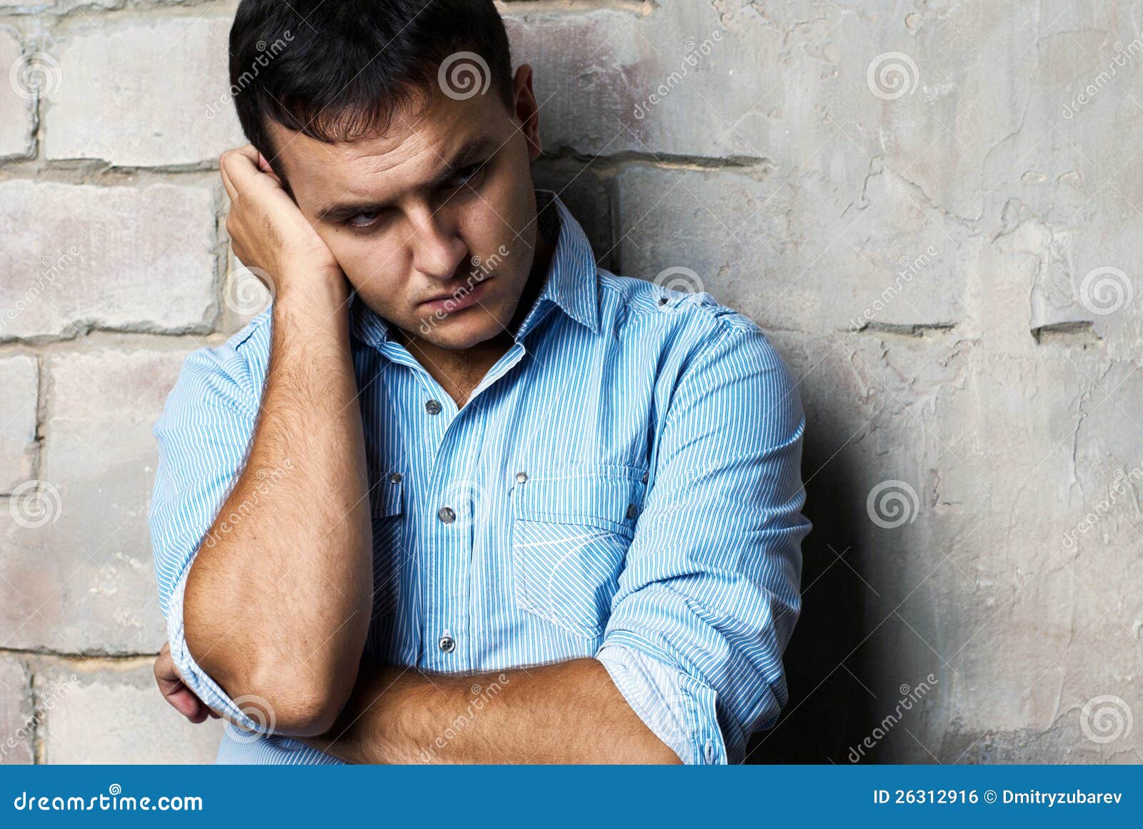 Sad guy against wall stock photo. Image of calm, depressed - 26312916