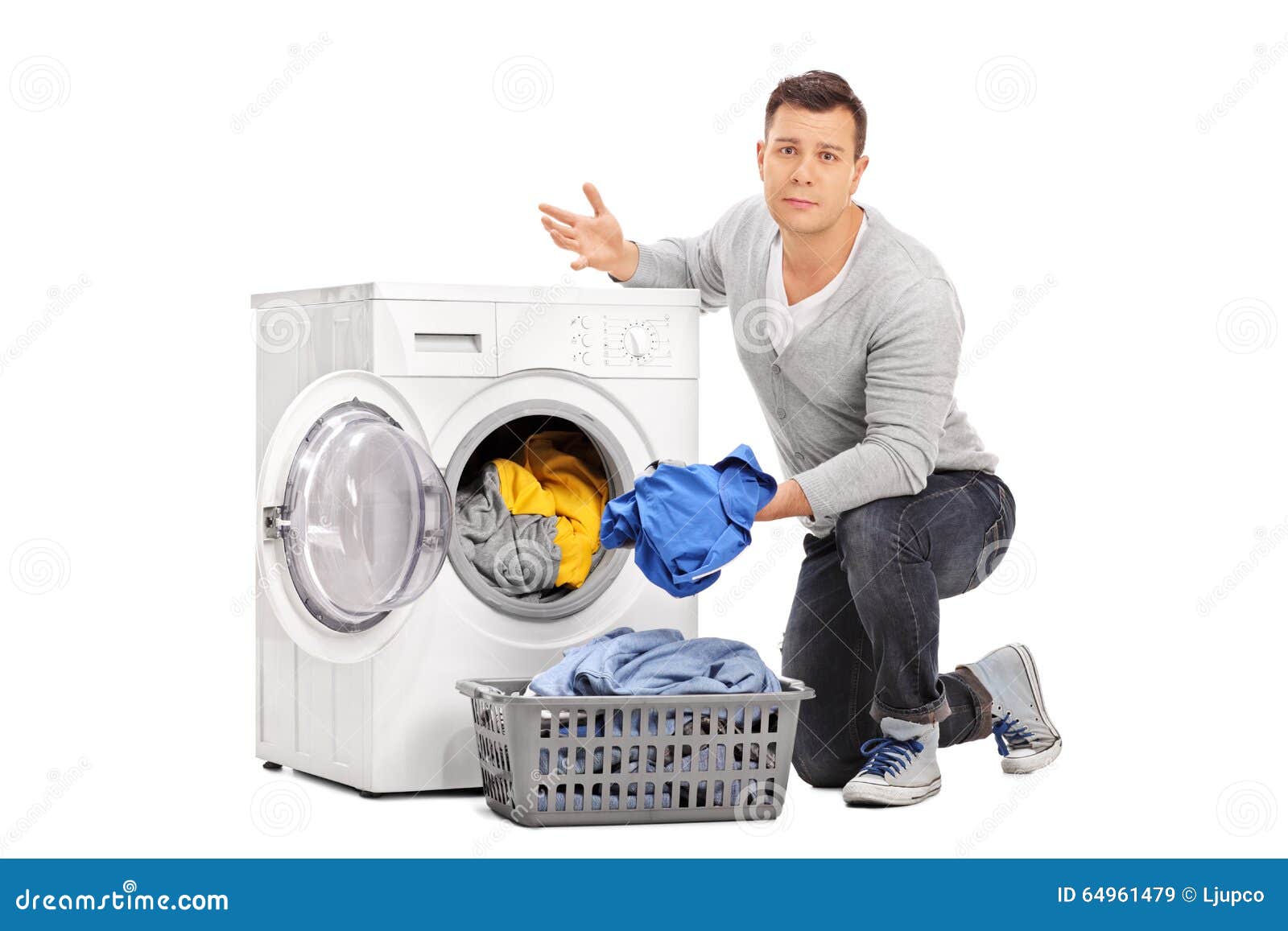 Sad Guy Emptying a Washing Machine Stock Image - Image of ...