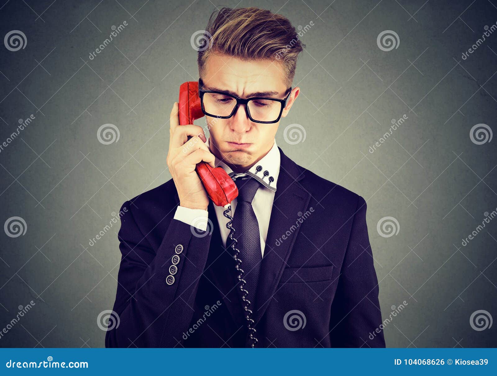 Sad Handsome Man Having Unpleasant Telephone Conversation Looking Down ...