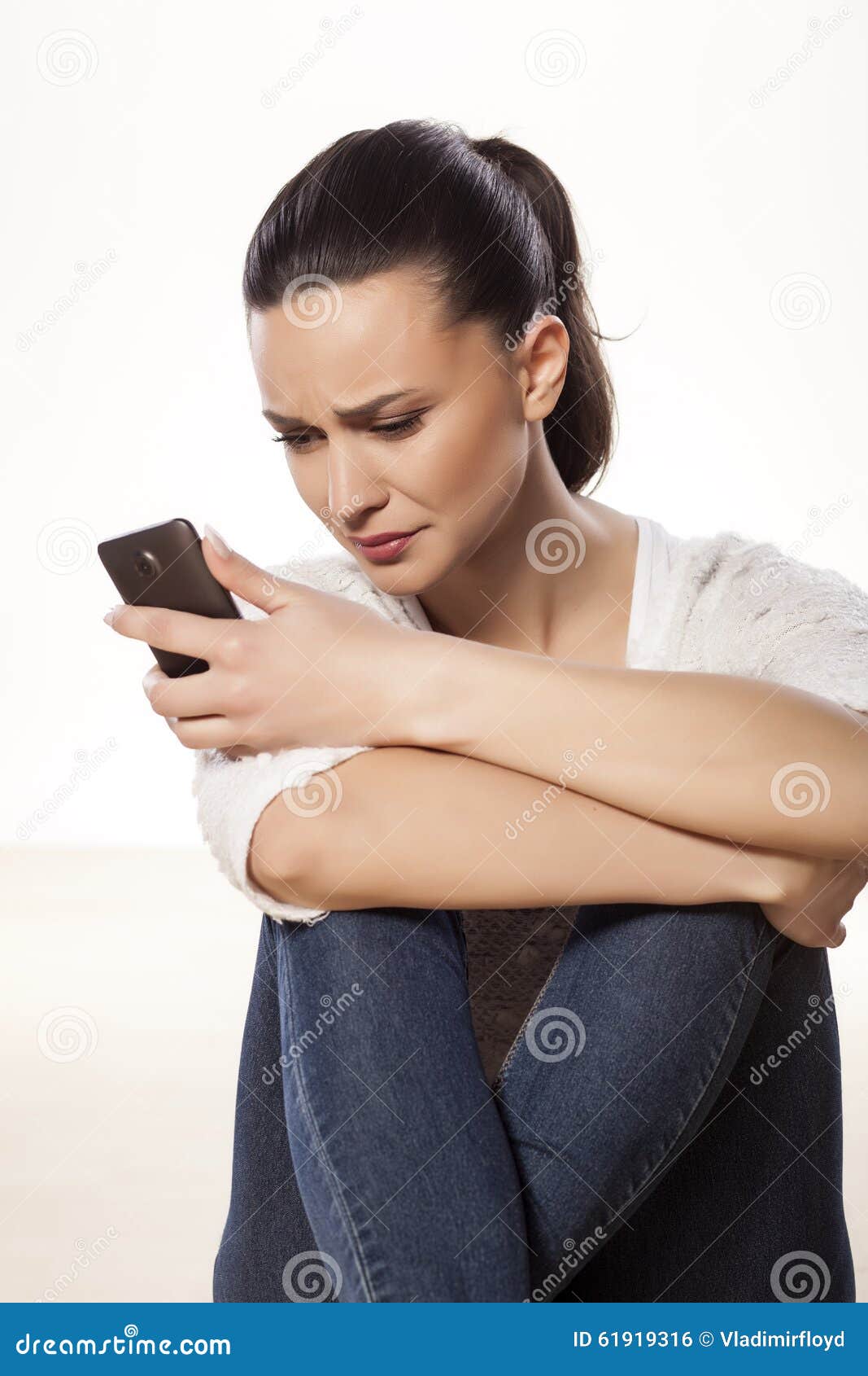 Sad with her phone stock photo. Image of text, cell, message - 61919316
