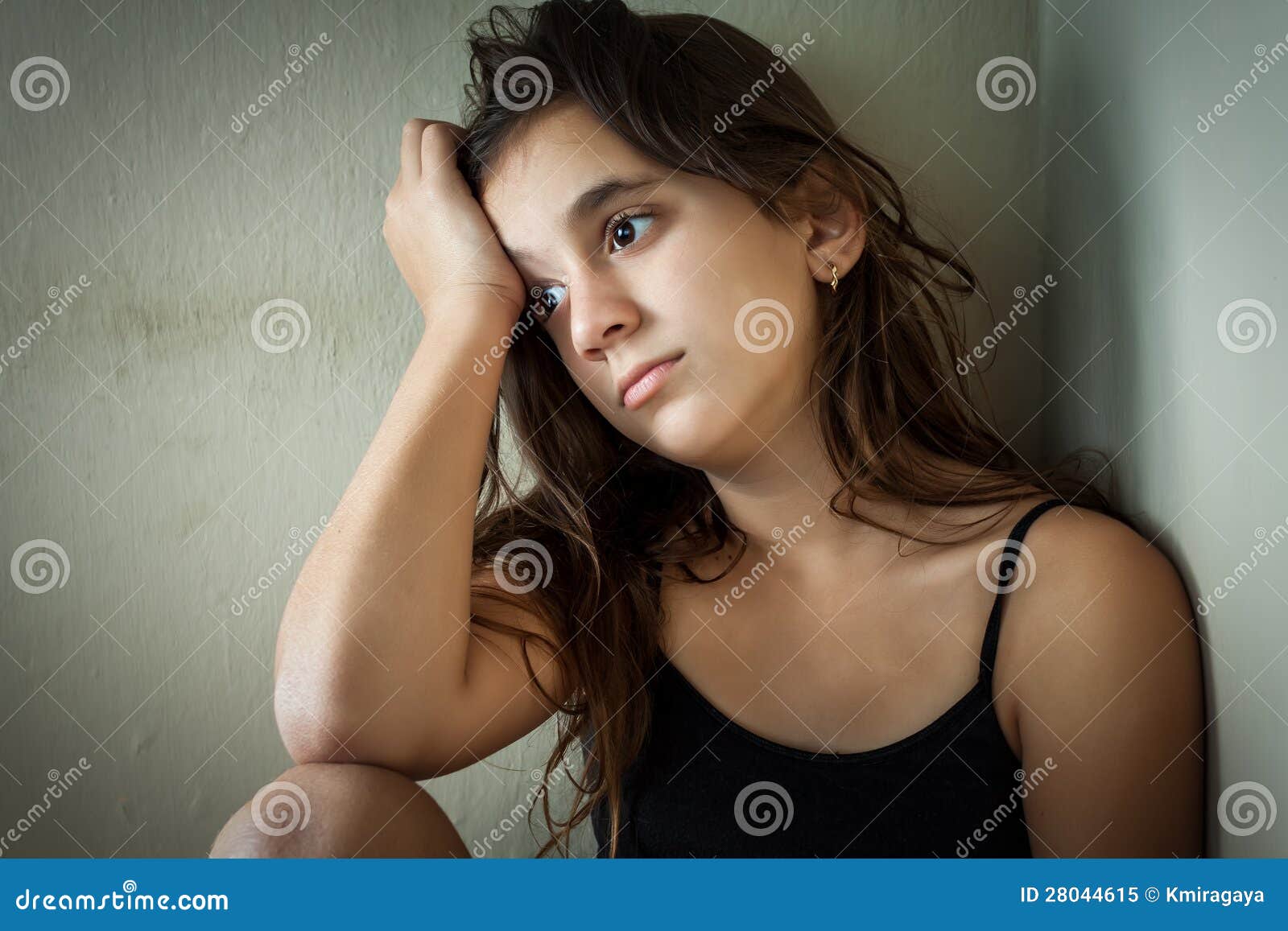Sad Hispanic Girl Sitting in a Corner Stock Image - Image of depressed ...