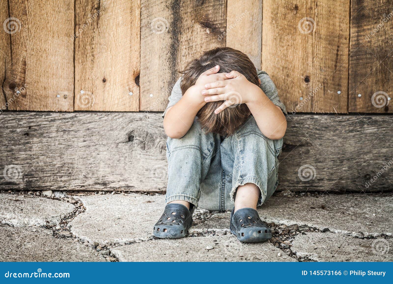 Sad Homeless Boy stock photo. Image of hungry, hurt - 145573166