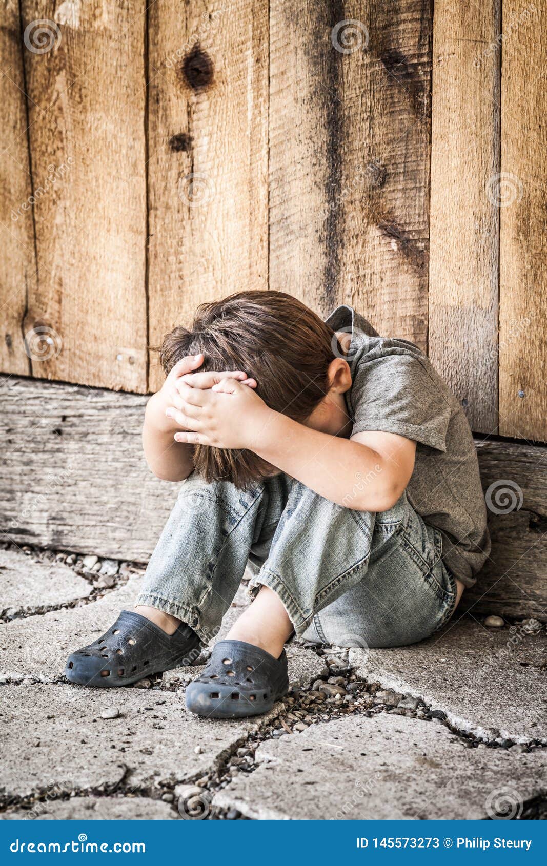 Sad Homeless Boy stock image. Image of humble, pain - 145573273