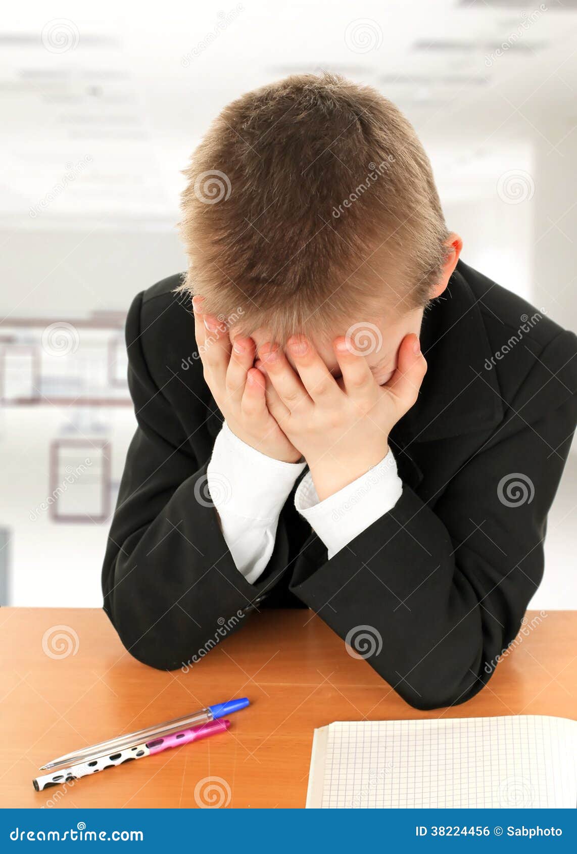 Sad Kid at the Desk stock photo. Image of indoor, caucasian - 38224456