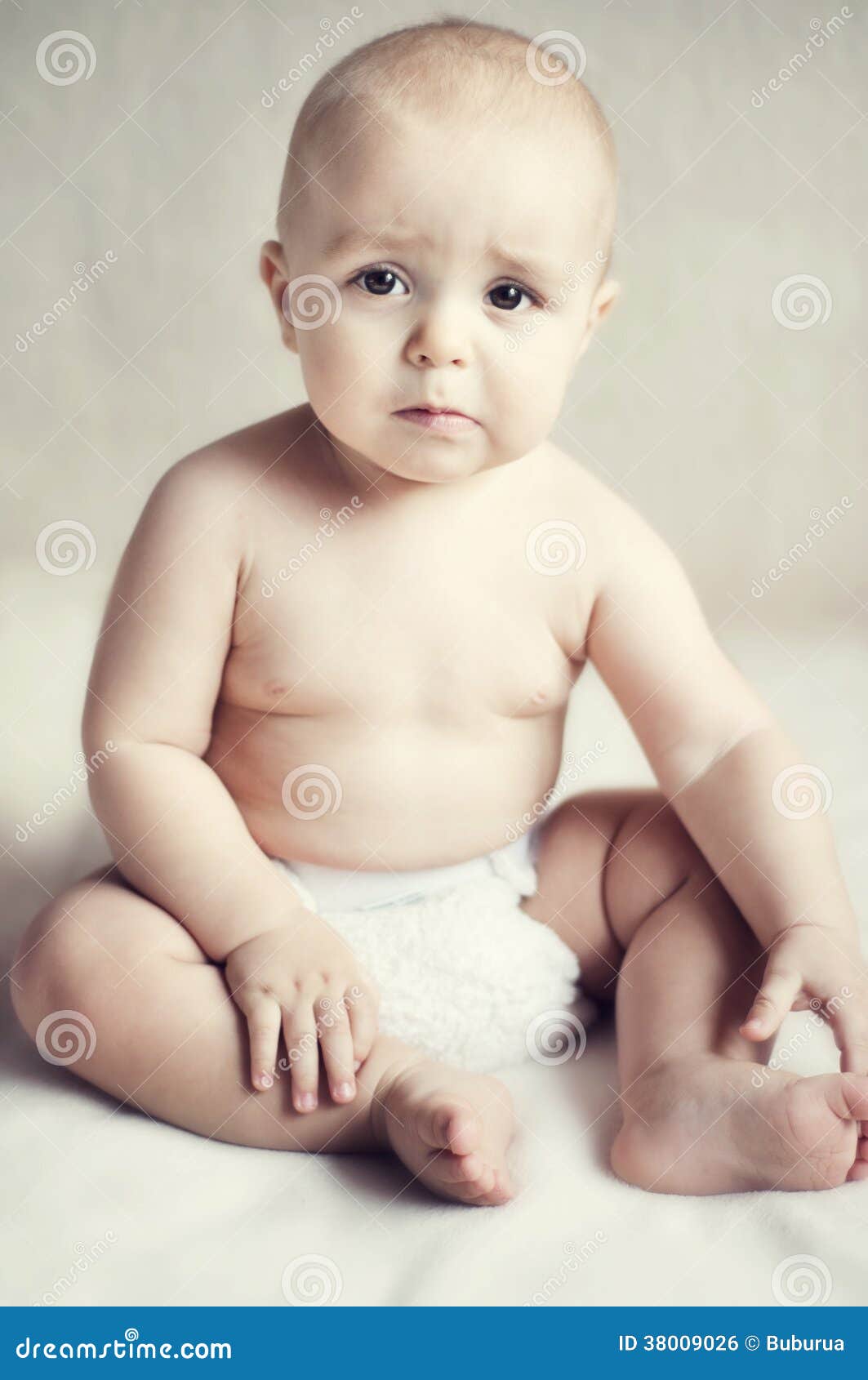 Sad Little Baby Sitting on the Bed Stock Photo - Image of delicate ...