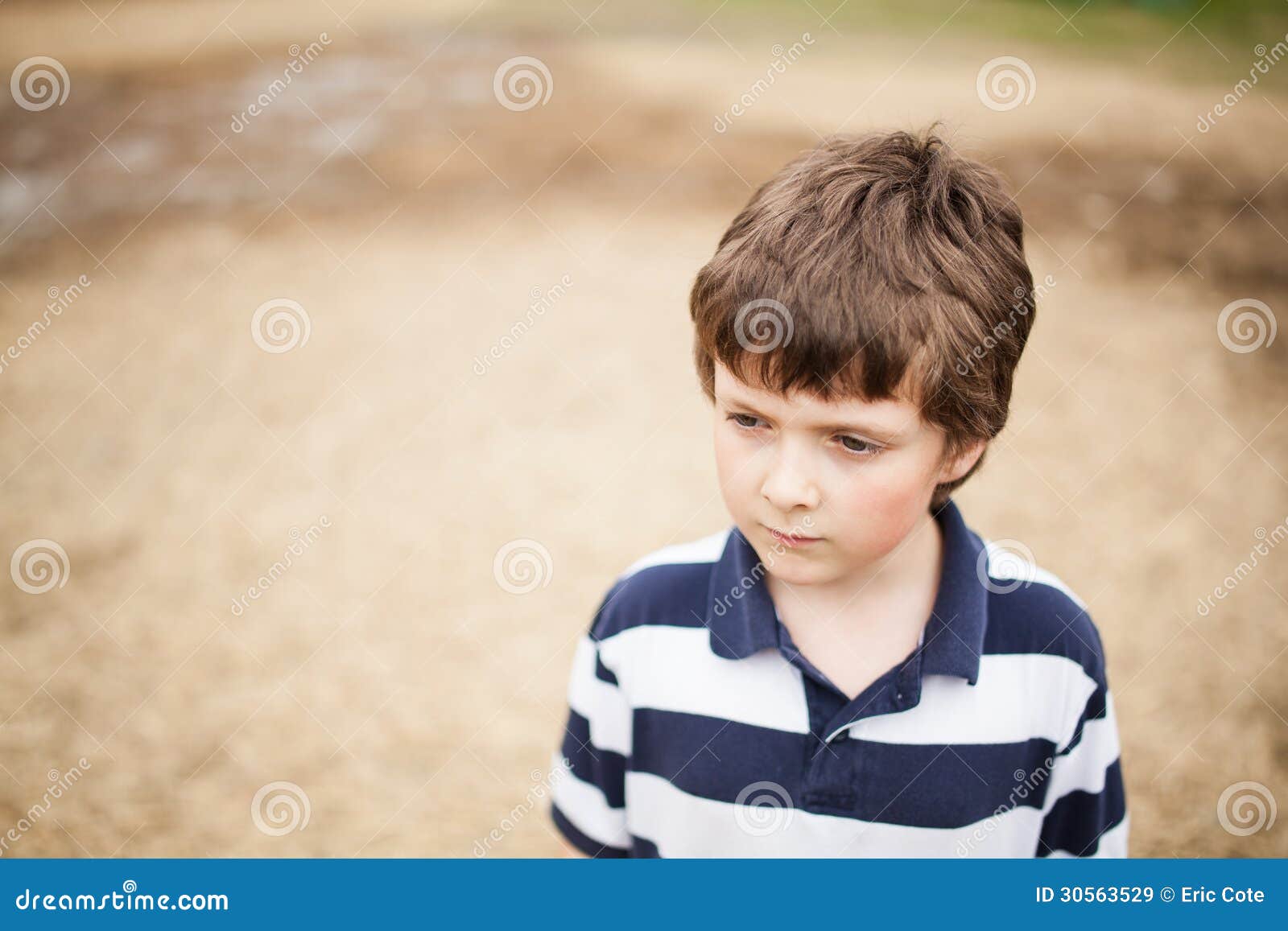 Sad Little Boy Standing