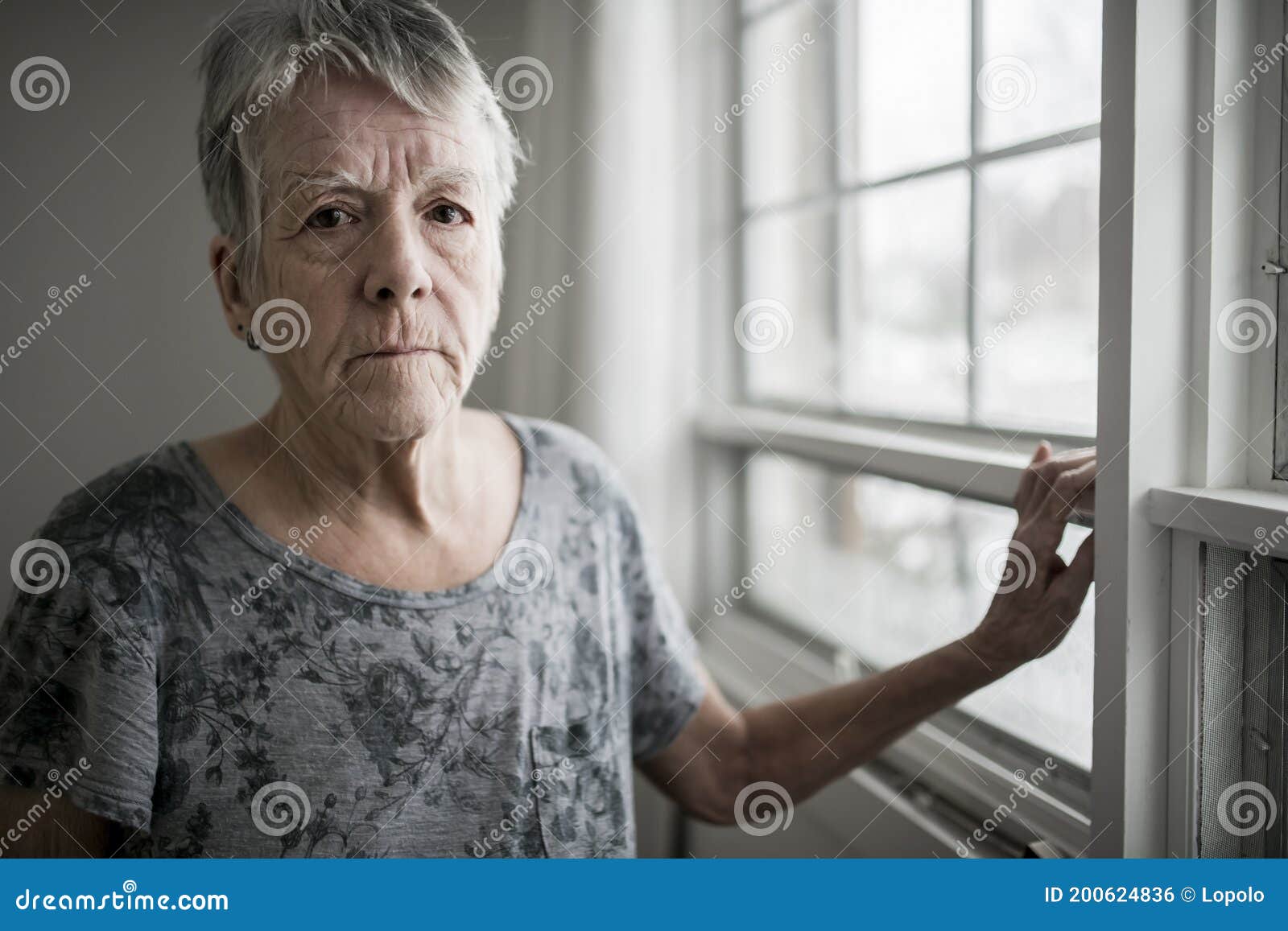 A Sad Lonely 70 Years Old Senior in is Apartment Stock Photo - Image of ...