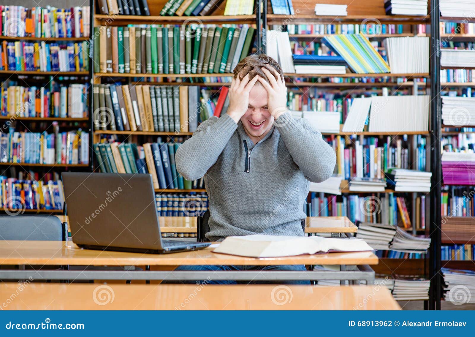 Sad Male Student in the University Library Stock Photo - Image of ...