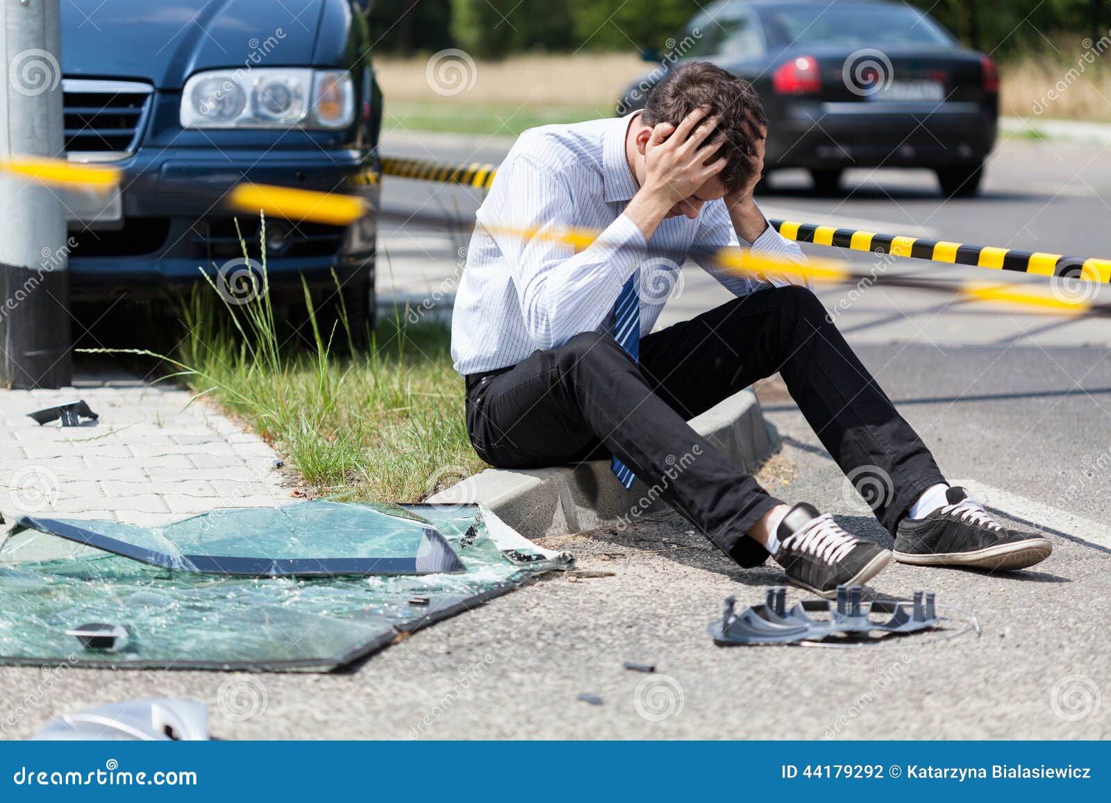 Sad man at accident scene stock photo. Image of secure - 44179292