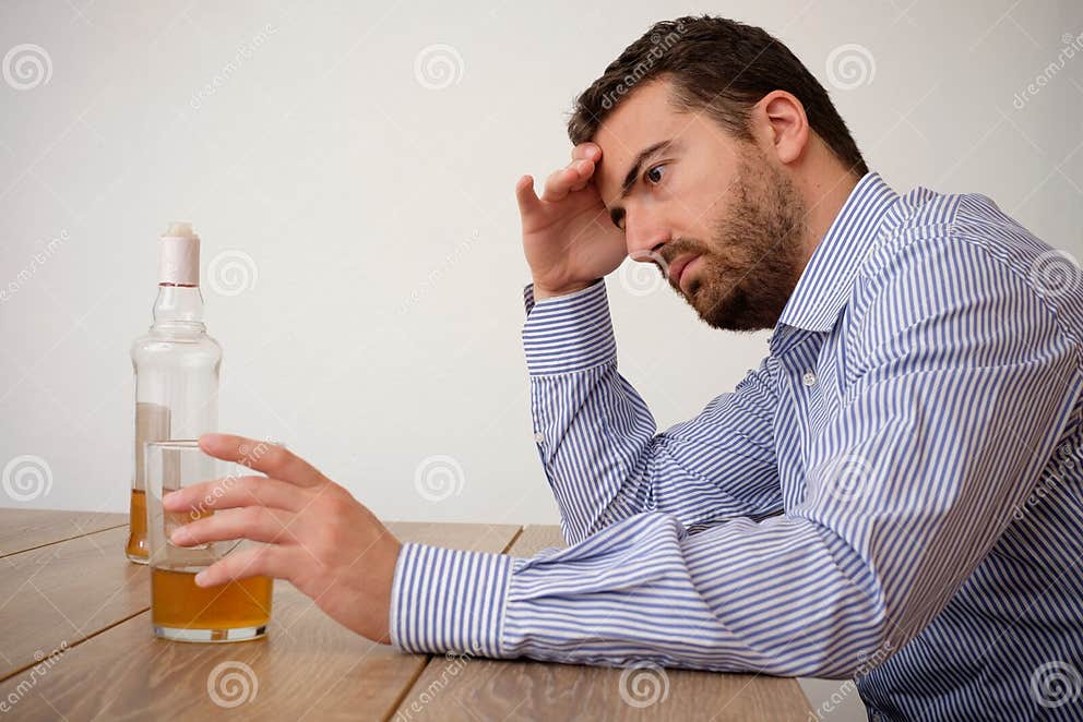 Sad man alcohol addicted stock image. Image of headaches - 75184493