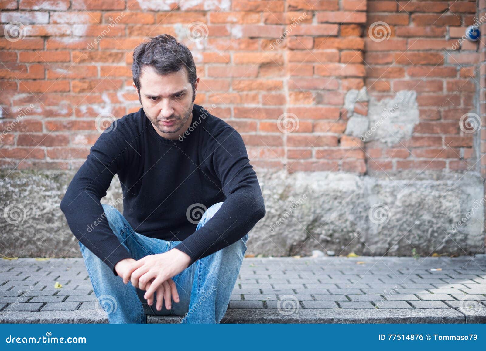 Sad man alone in the city stock photo. Image of street - 77514876