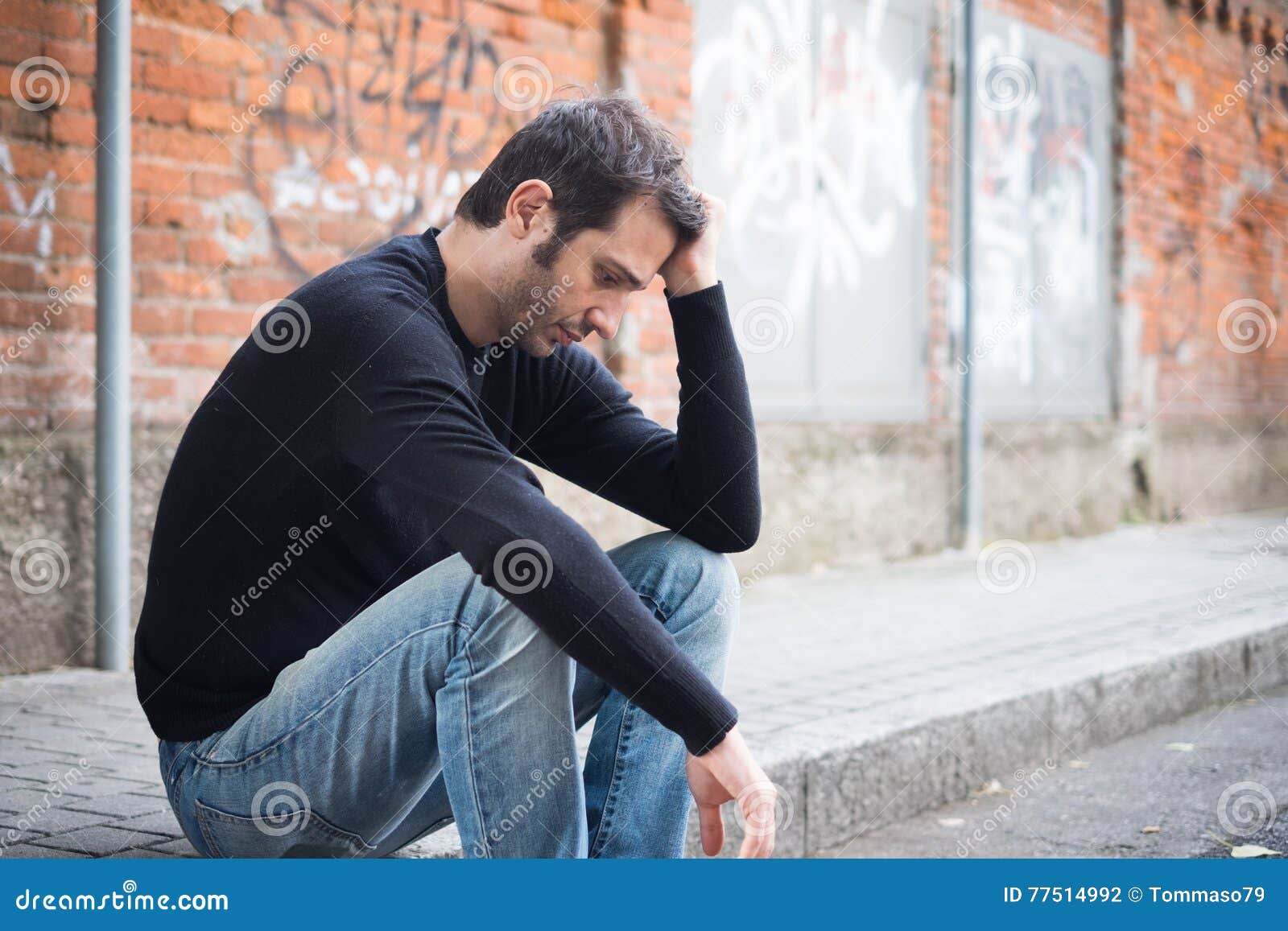 Sad man alone in the city stock photo. Image of face - 77514992