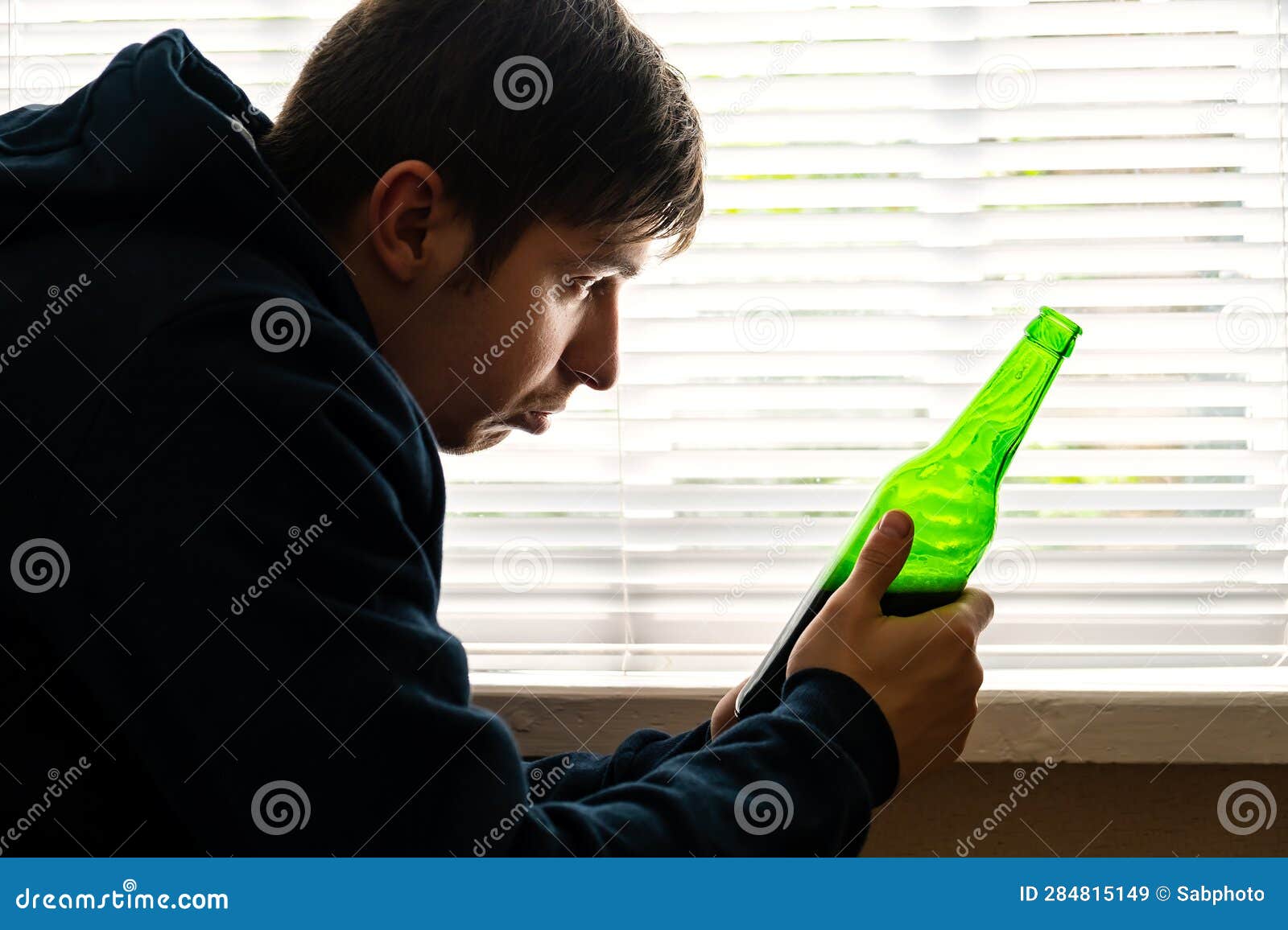 Sad Man with a Beer stock image. Image of unhappy, drinker - 284815149