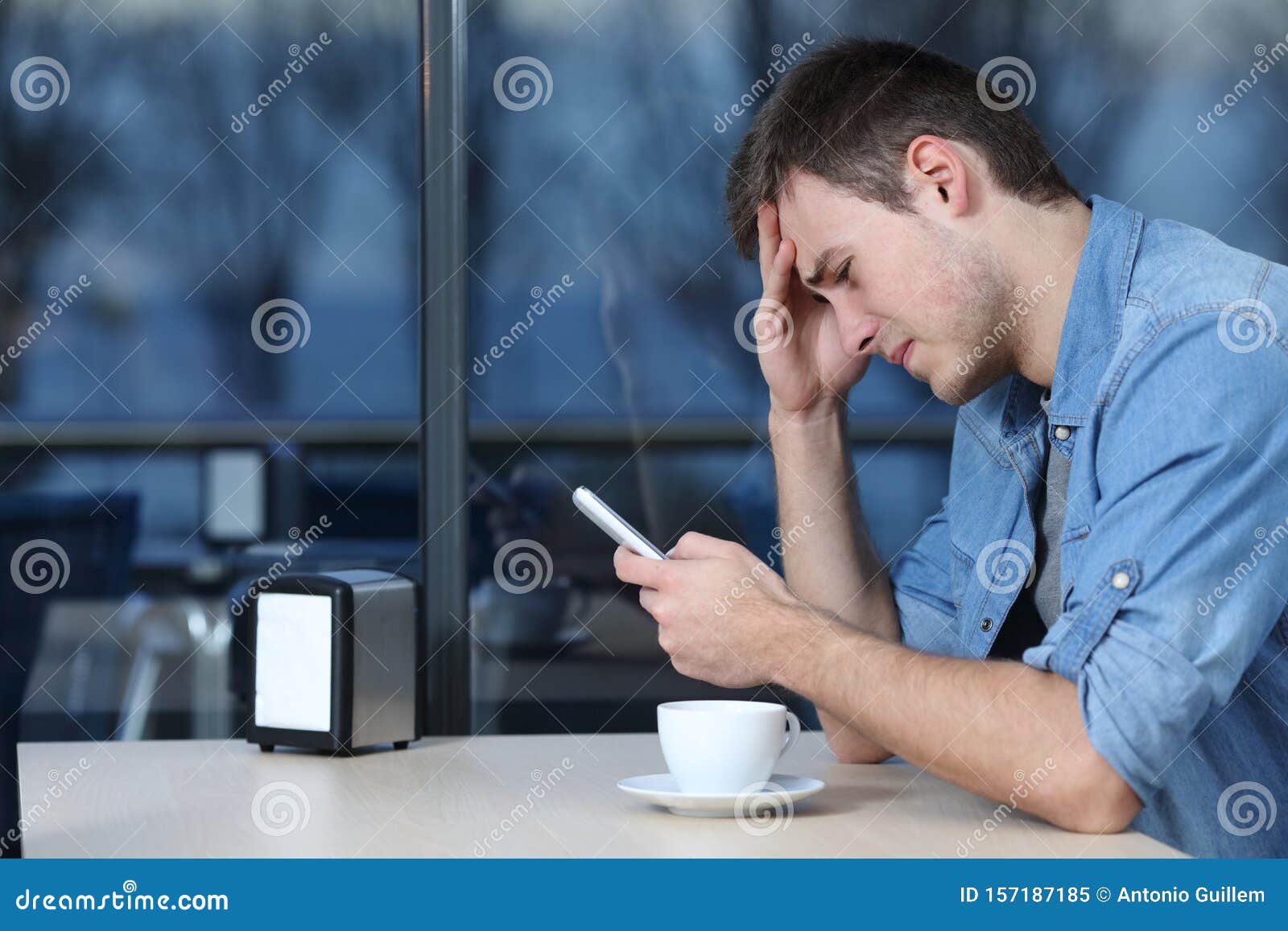 Sad Man Checking Phone Message in a Coffee Shop Stock Image - Image of ...