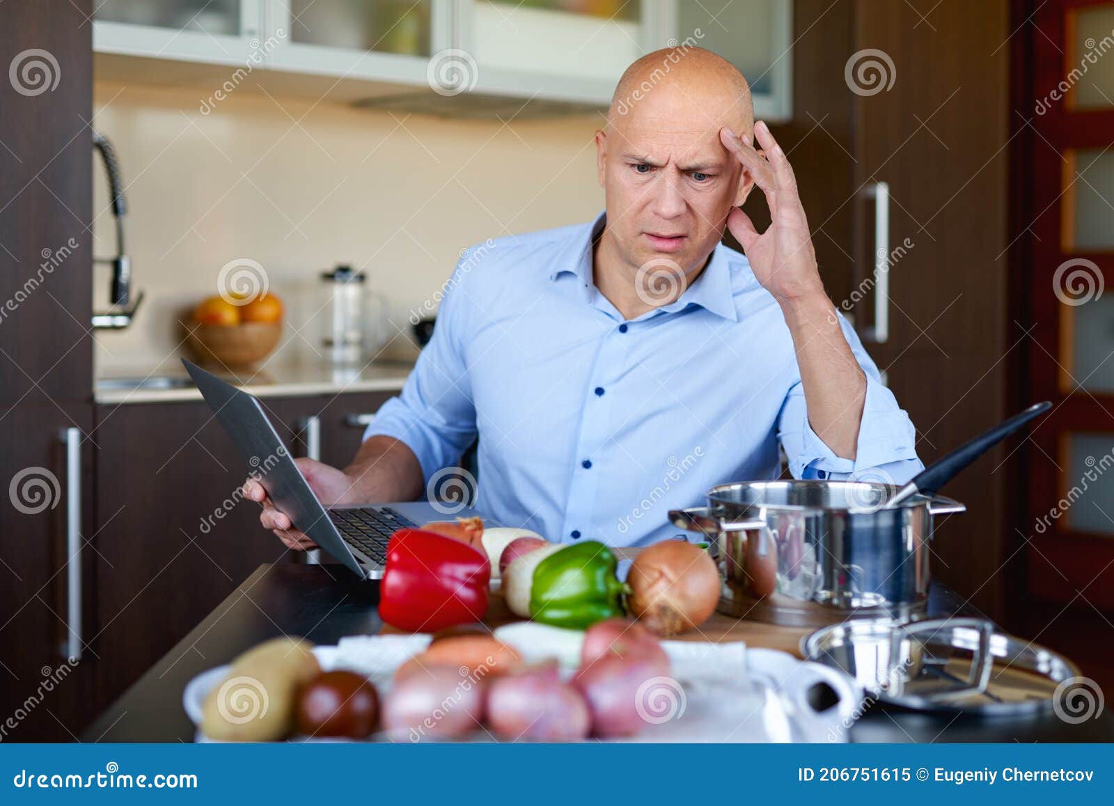 Sad Man Cooking with Help of Recipe on Tablet. Stock Image - Image of ...