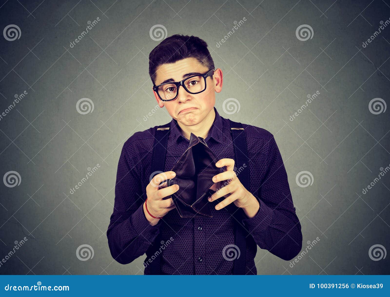 Sad man with empty wallet stock photo. Image of loan - 100391256