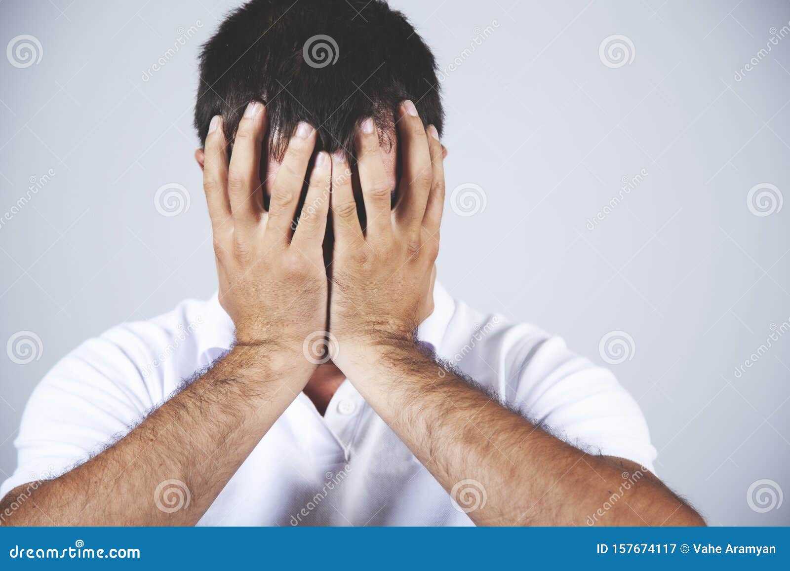 Man Hand Face Stock Images - Download 128,862 Royalty Free Photos