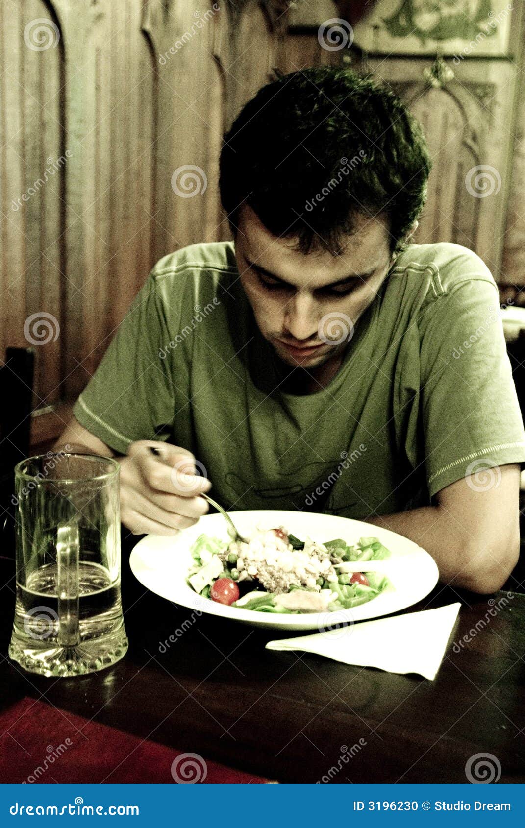Sad man having a meal stock photo. Image of downhearted - 3196230