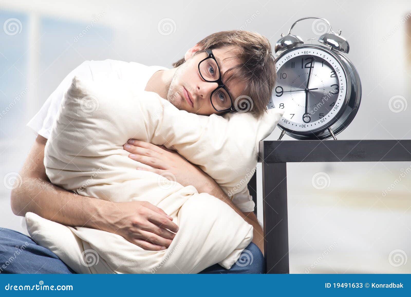 Sad man holding pillow stock image. Image of resting - 19491633