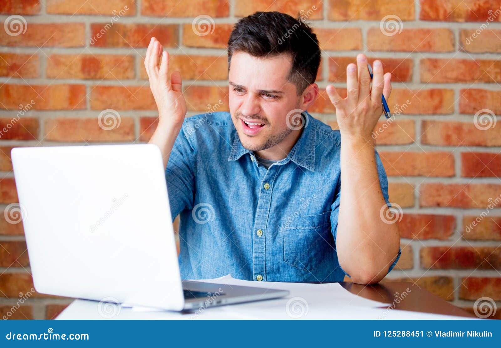 Sad Man with Laptop Computer Stock Image - Image of caucasian, indoor ...