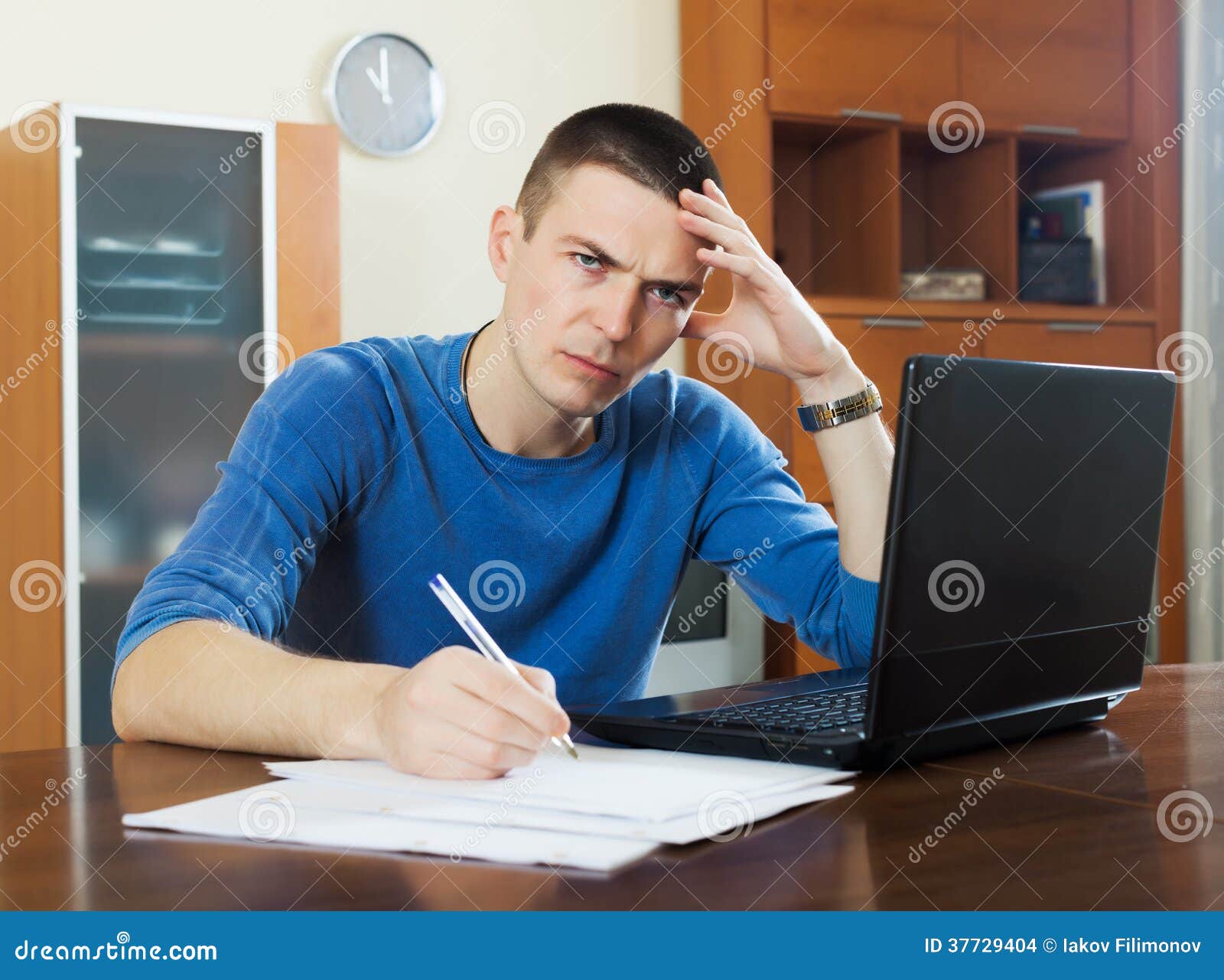 Sad Man with Laptop and Documents Stock Photo - Image of pensive ...