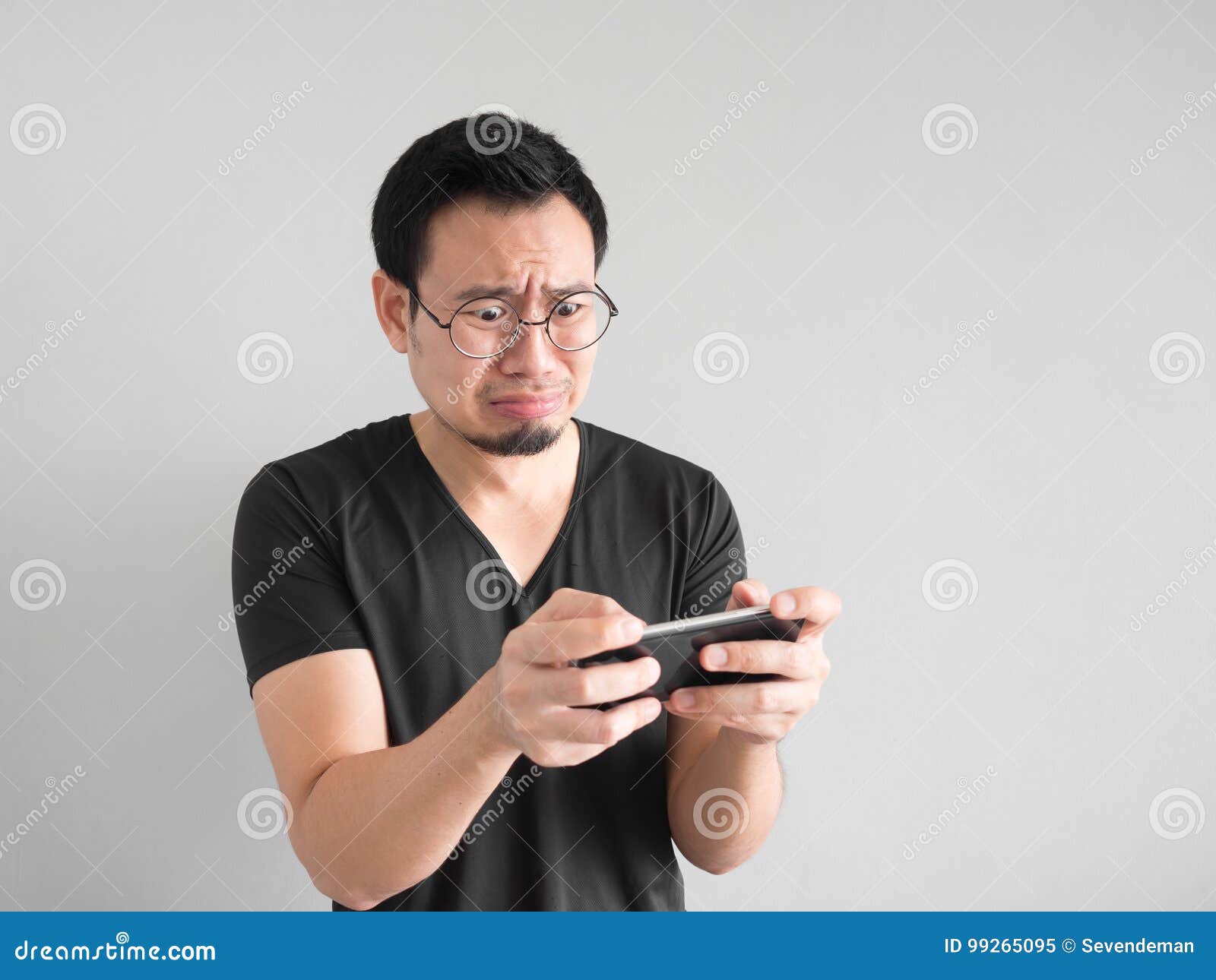 Sad Man Lost the Mobile Game. Stock Image - Image of game, person: 99265095