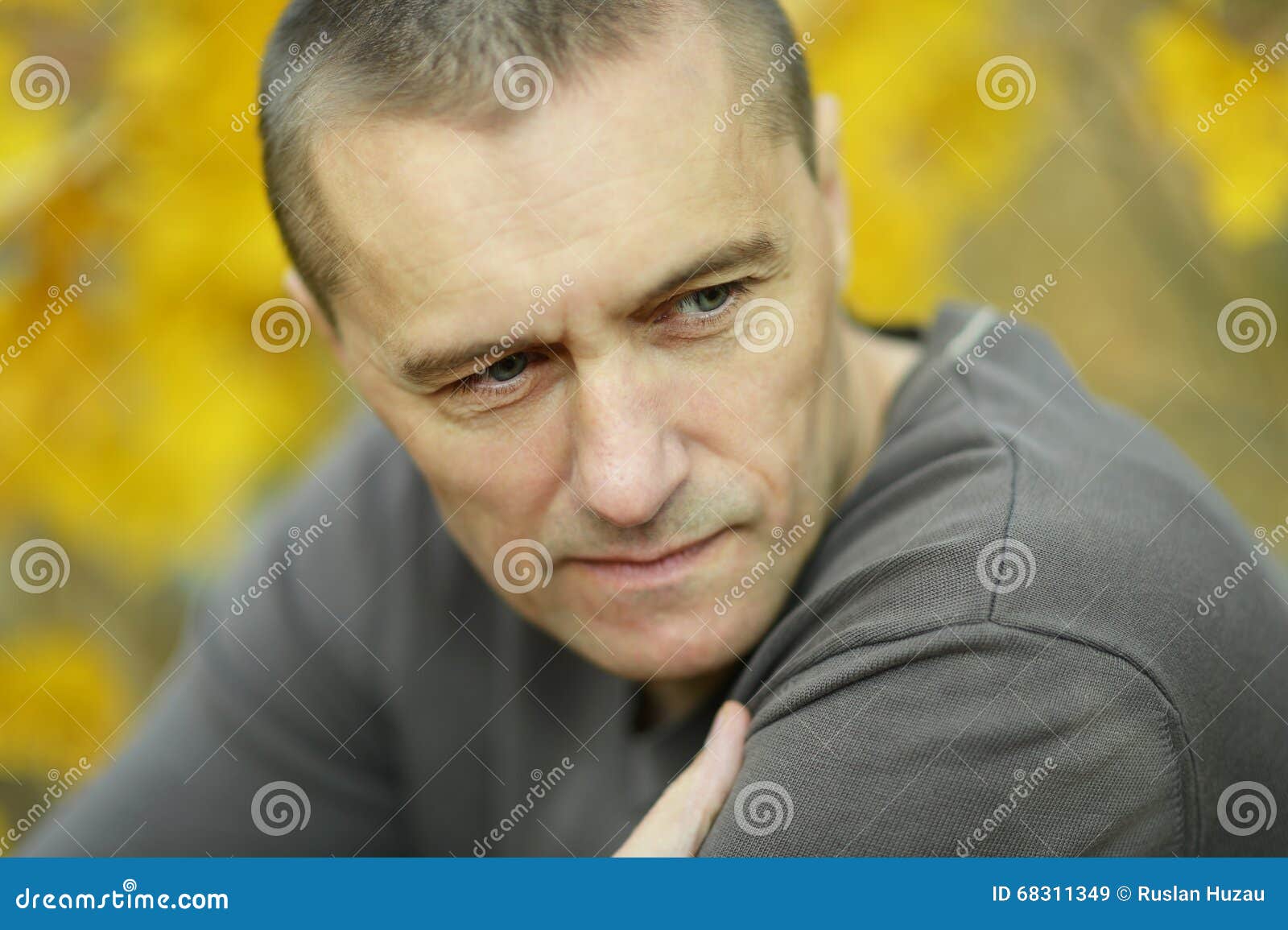 Sad man out for a walk stock image. Image of attractive - 68311349
