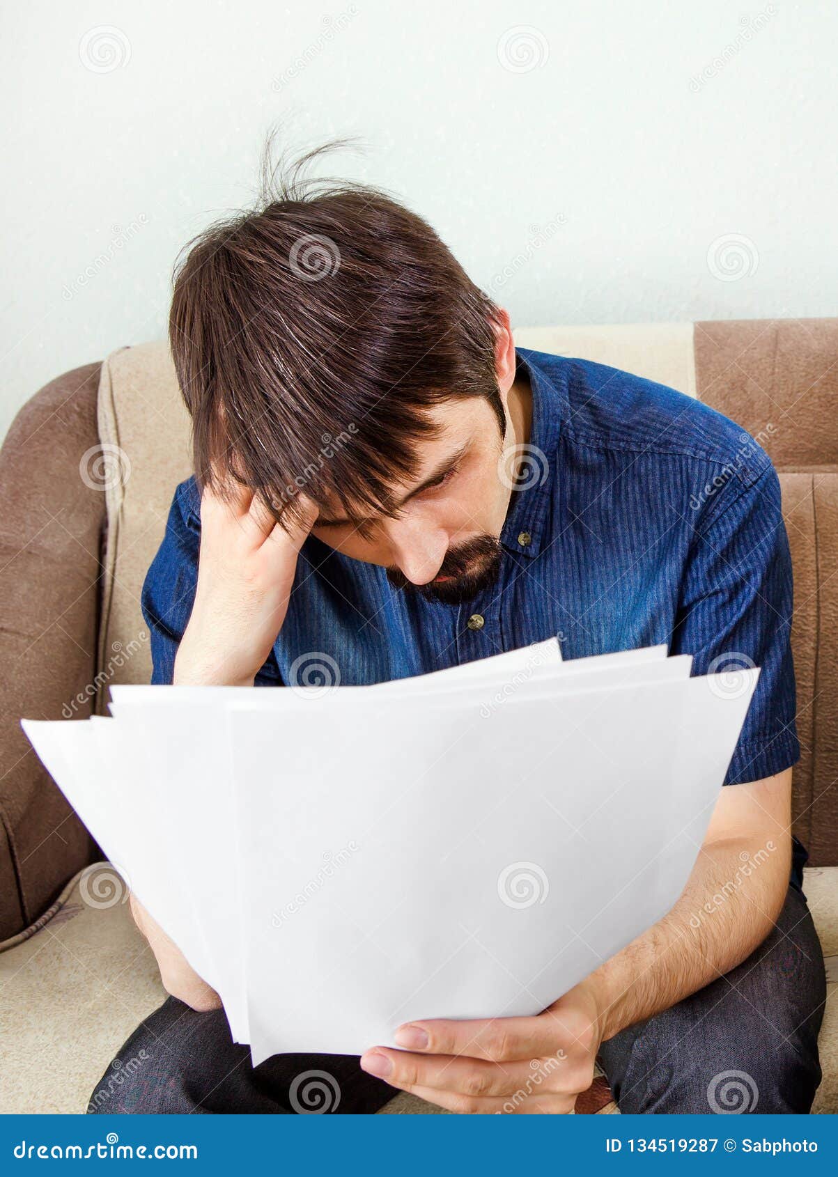Sad Man with a Papers stock image. Image of sadness - 134519287