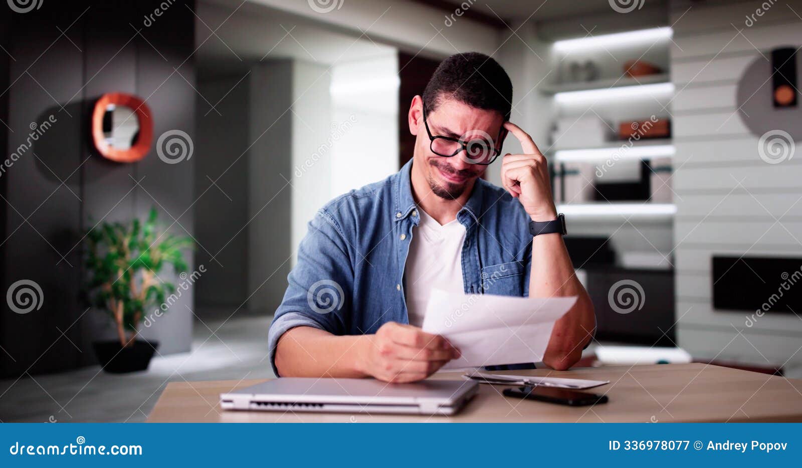 Sad Man Reading Paper Invoice Stock Image - Image of shock, news: 336978077