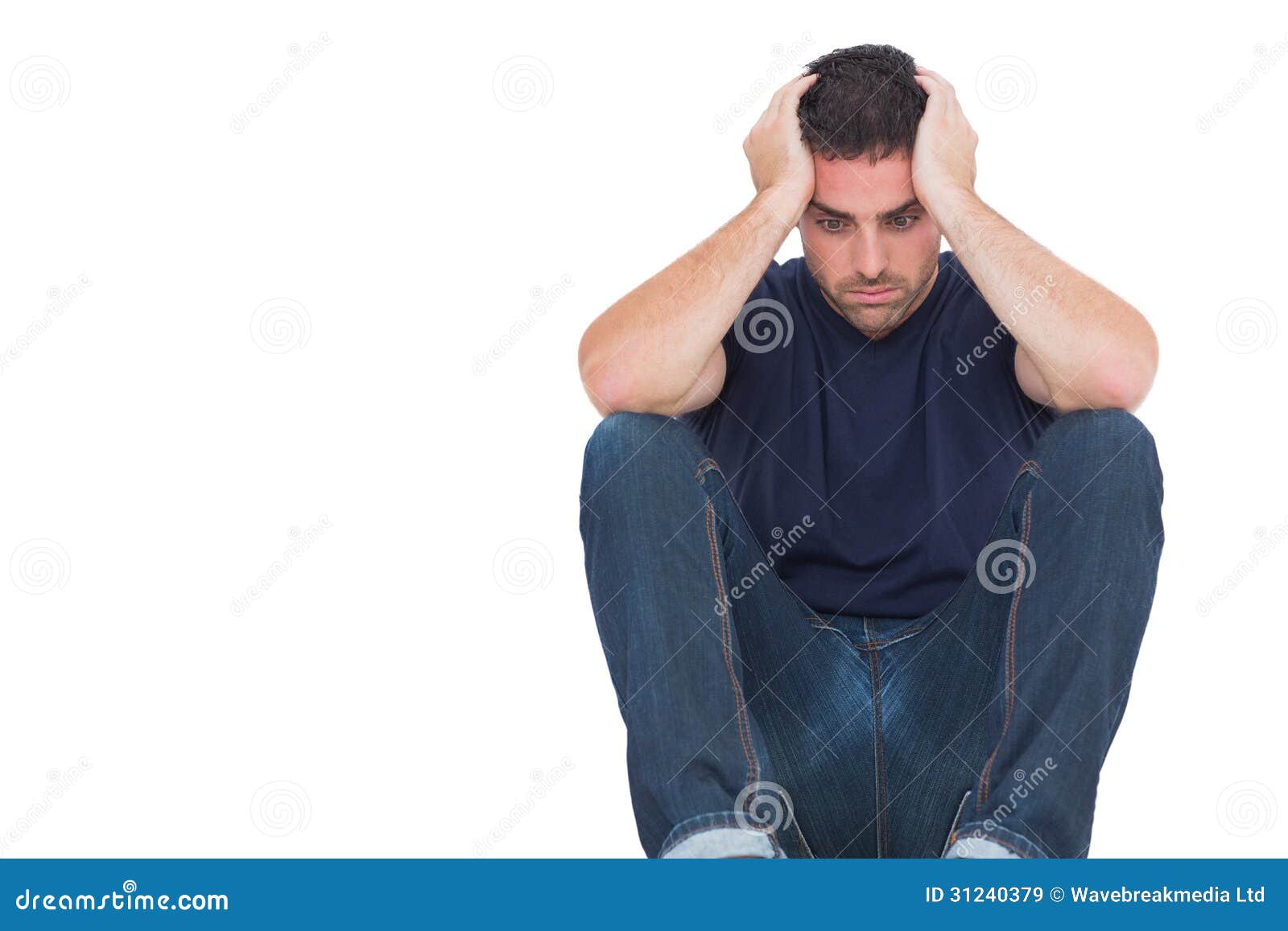 Sad Man Sitting On The Floor While Holding His Head Stock Image - Image ...