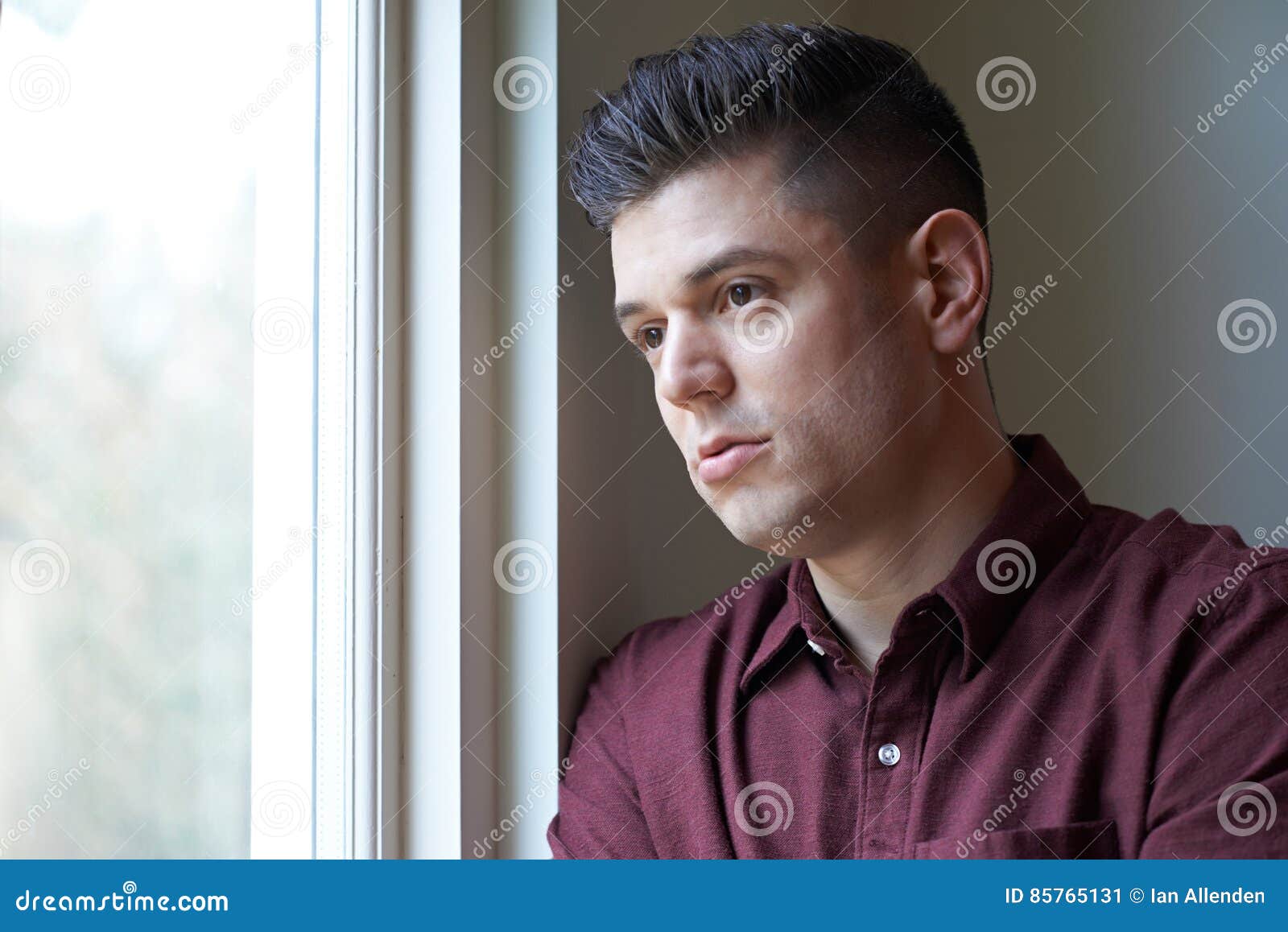 Sad Man Suffering from Depression Looking Out of Window Stock Image ...