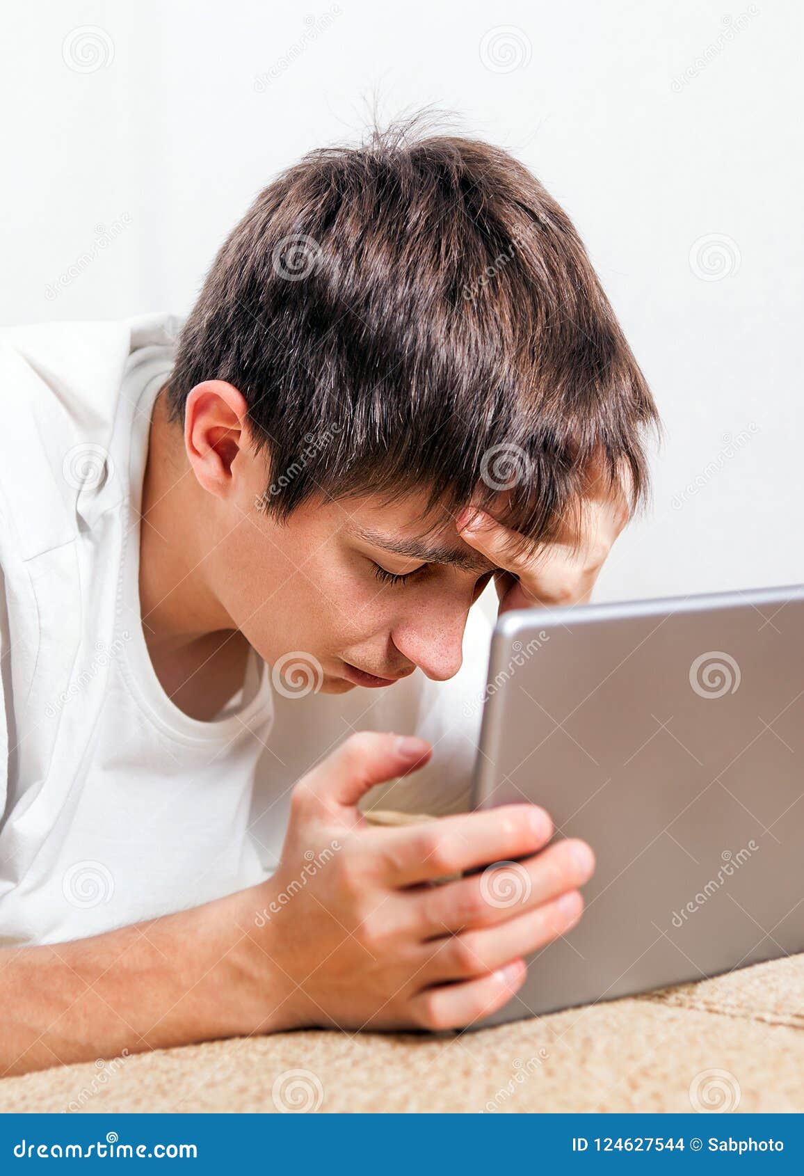 Sad Man with a Tablet stock photo. Image of message - 124627544
