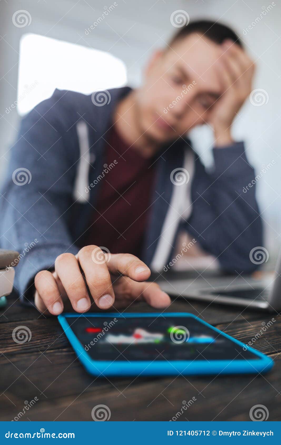 Sad man touching his phone stock photo. Image of modern - 121405712