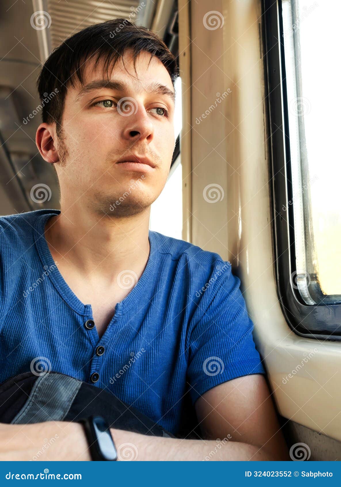 Sad Man in the Train stock photo. Image of outgoing - 324023552