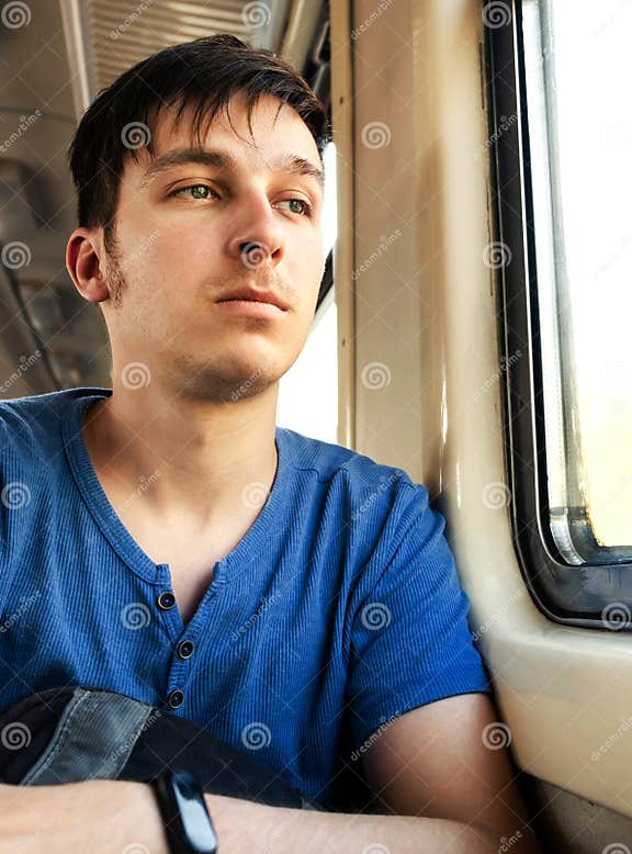 Sad Man in the Train stock photo. Image of outgoing - 324023552