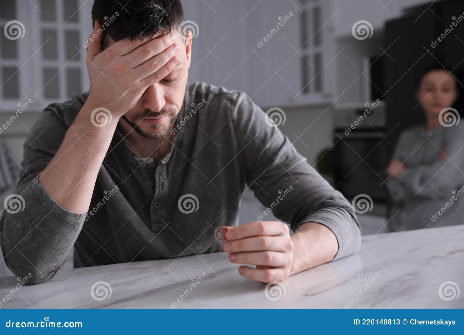 Sad Man with Wedding Ring in Kitchen. Couple on Verge of Divorce Stock ...