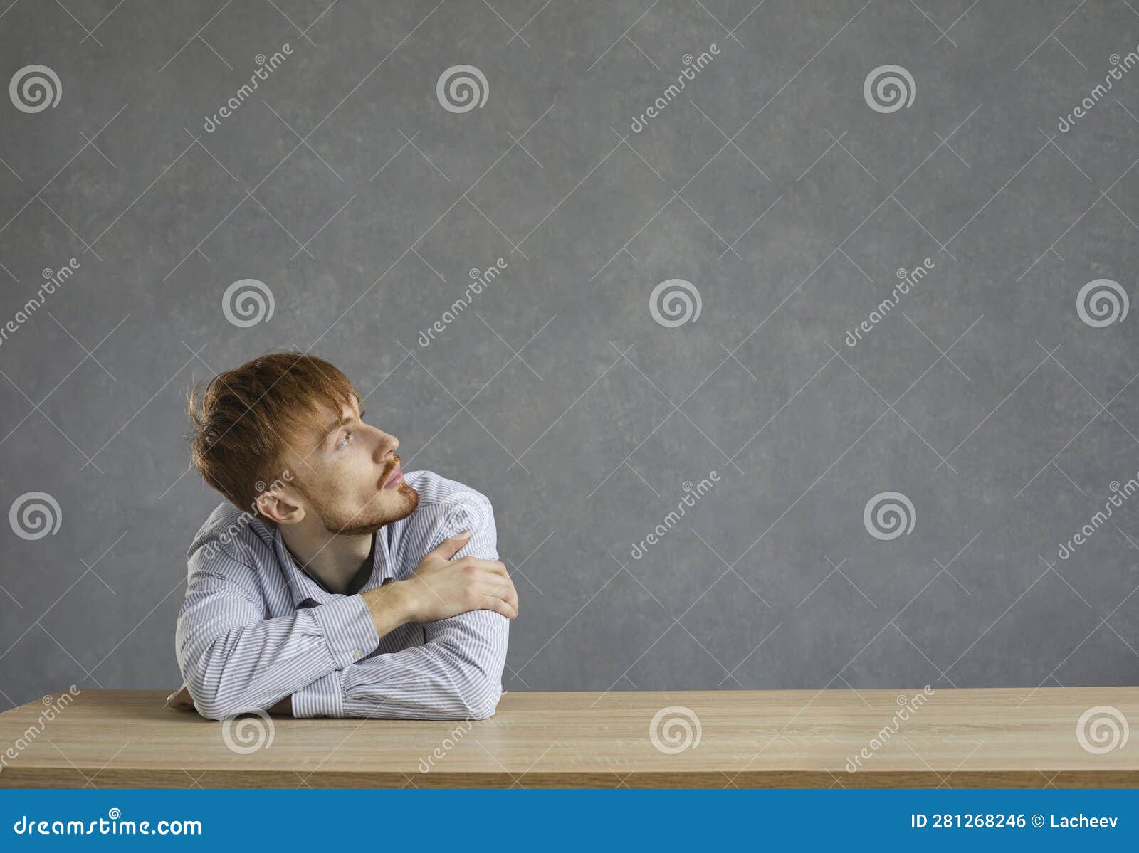 Sad Pensive Man Sitting at Desk and Thinking Looking Away at Grey Copy ...