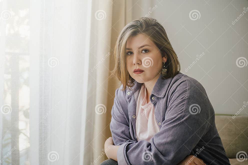 Sad Plus-Size Woman Looking at Camera Stock Image - Image of moment ...