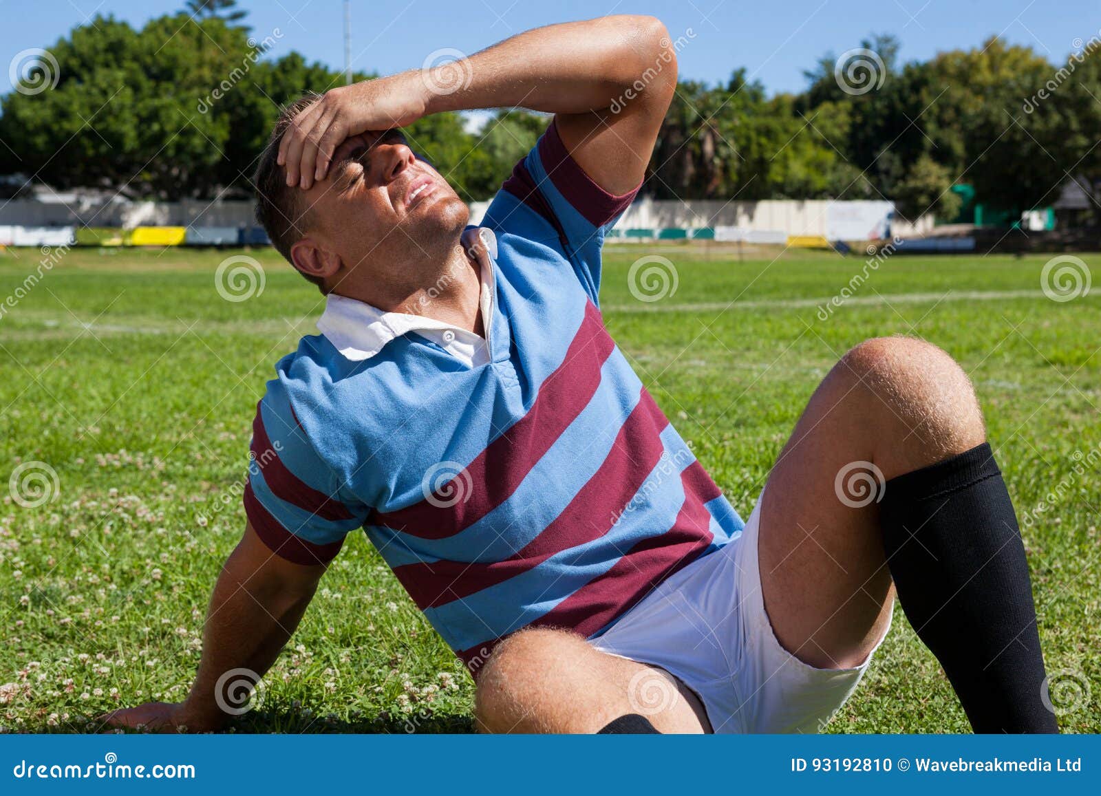 Sad Rugby Player Sitting on Field Stock Photo - Image of competitive ...